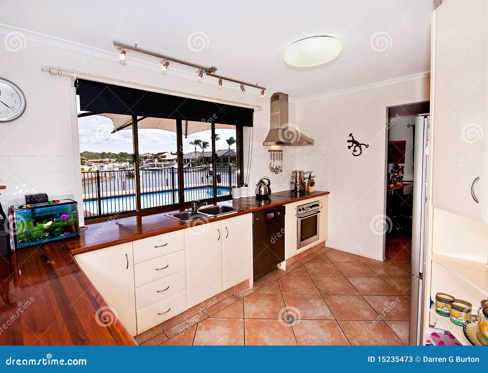 Kitchen Overlooking Pool stock image. Image of prepare - 15235473