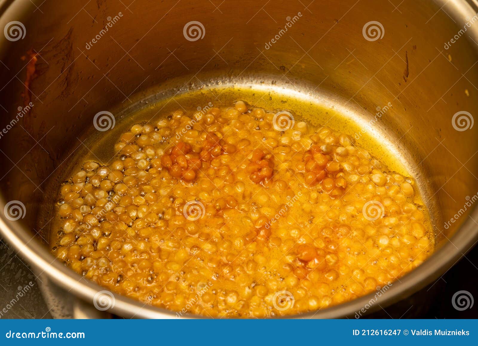 From Corn Kernels To Popcorn in the Kitchen Pot Stock Image - Image of ...
