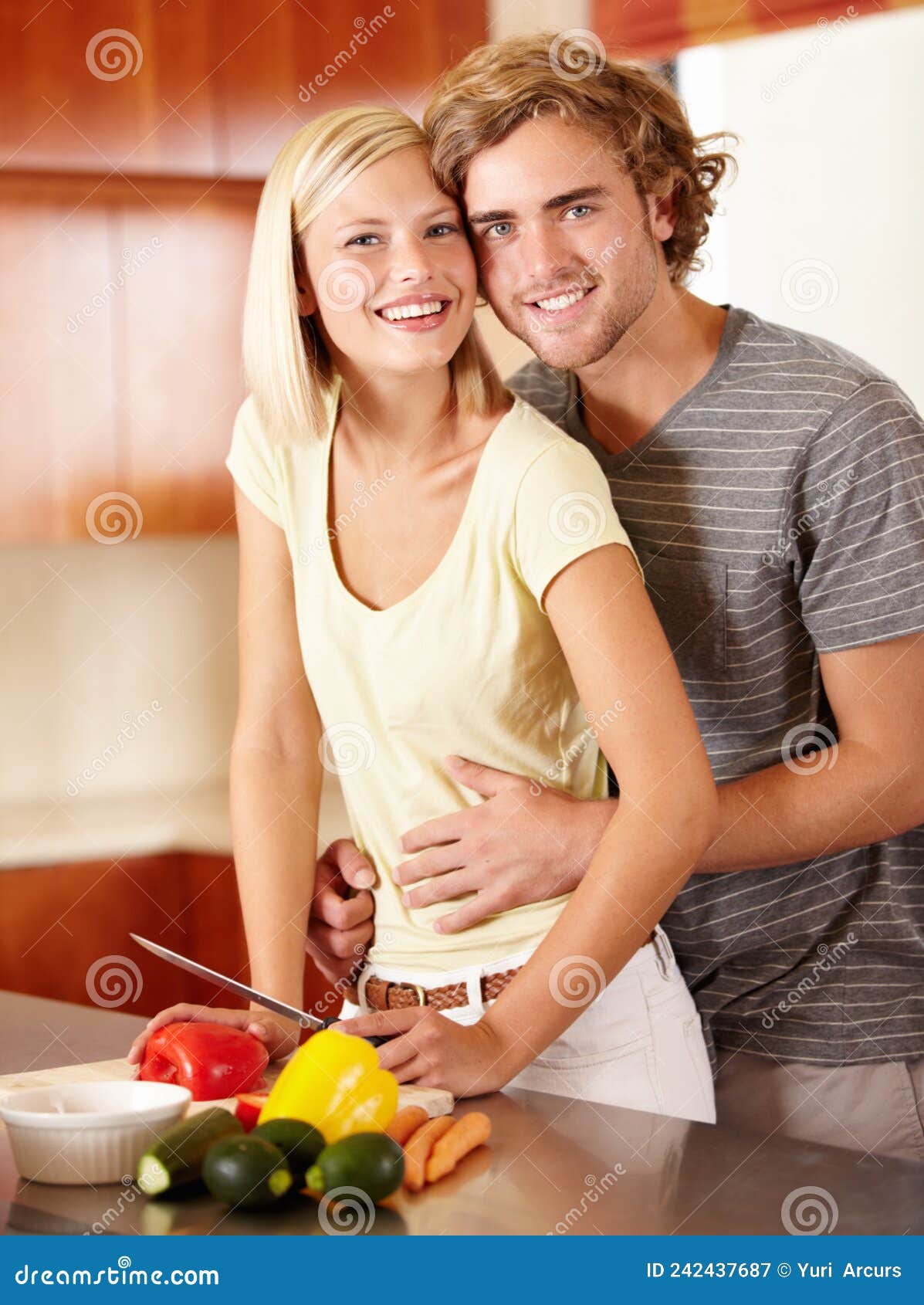 Kitchen Romance. Portrait of a Happy Young Couple Standing in the ...