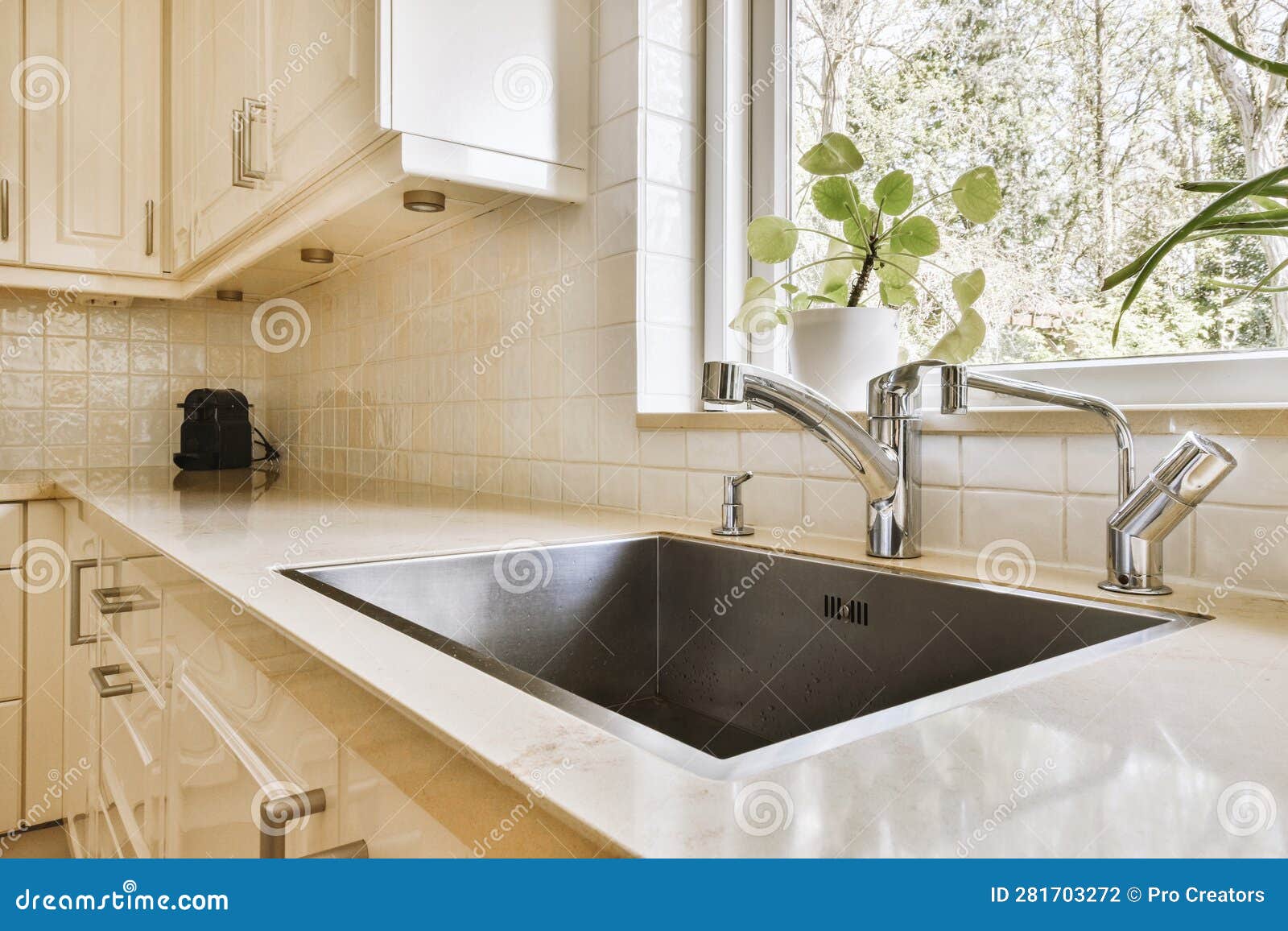 A Kitchen Sink in Front of a Window Stock Photo - Image of furniture ...