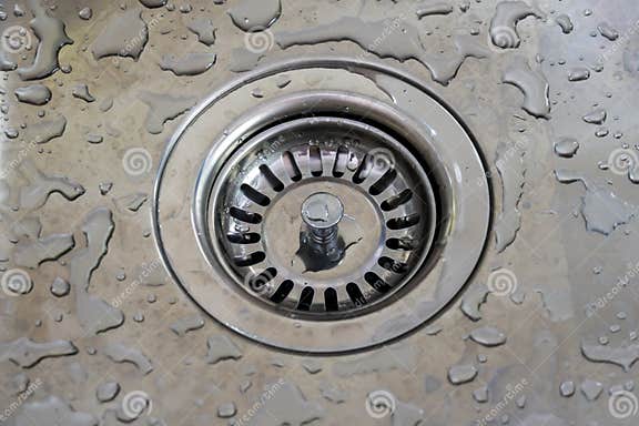 Kitchen Sink Plug Hole Closeup with Water Stock Photo - Image of ...