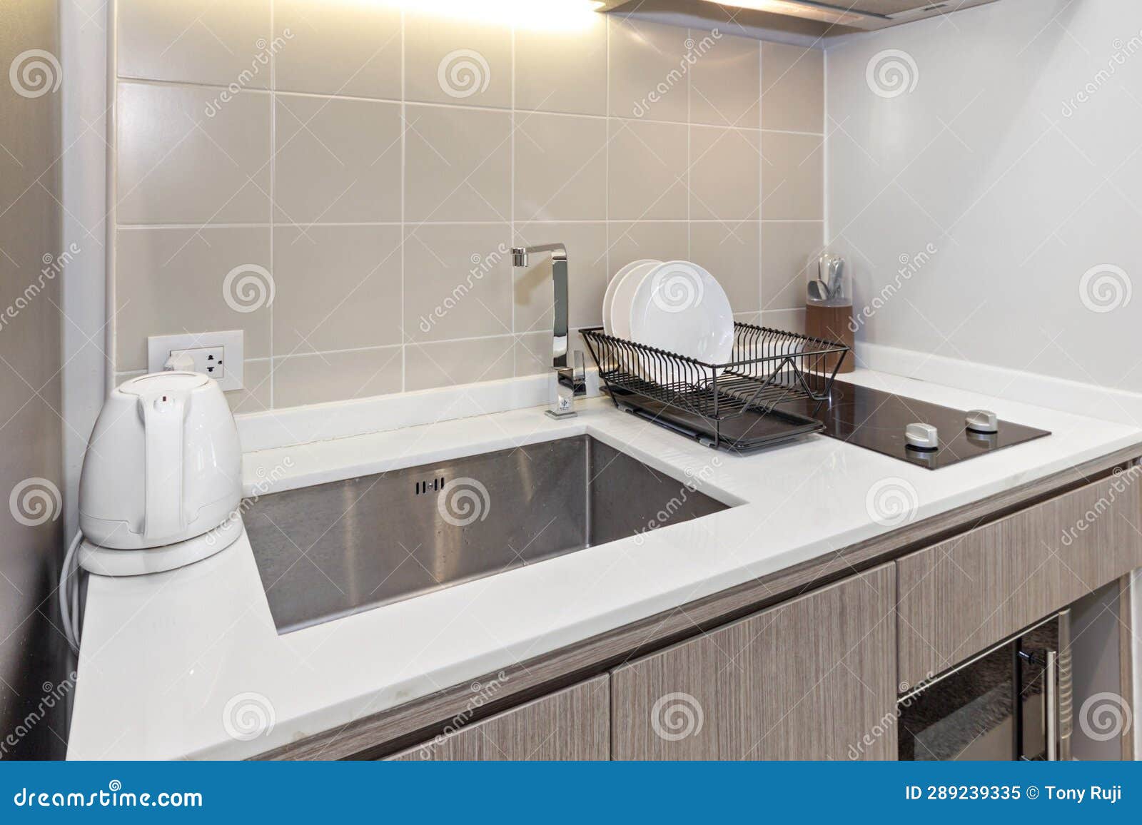 Kitchen sink with tiles stock image. Image of cabinetry - 289239335