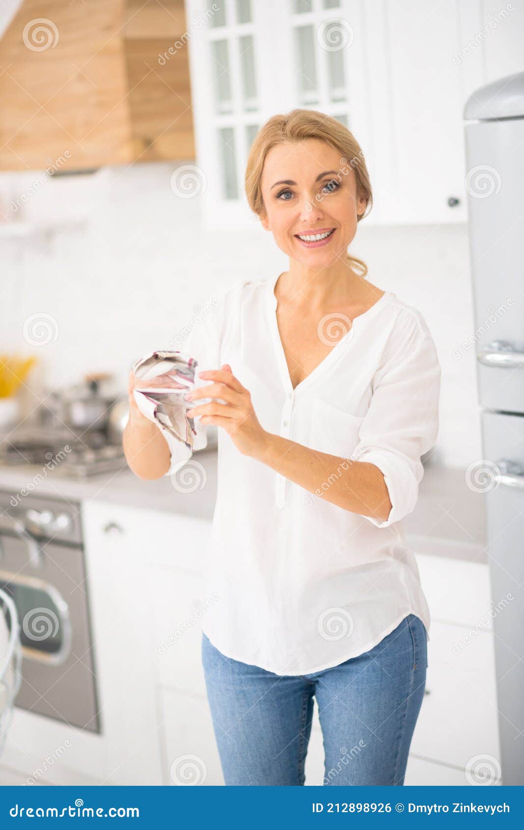 Smiling Pretty Housewife Standing in the Kitchen Stock Photo - Image of ...