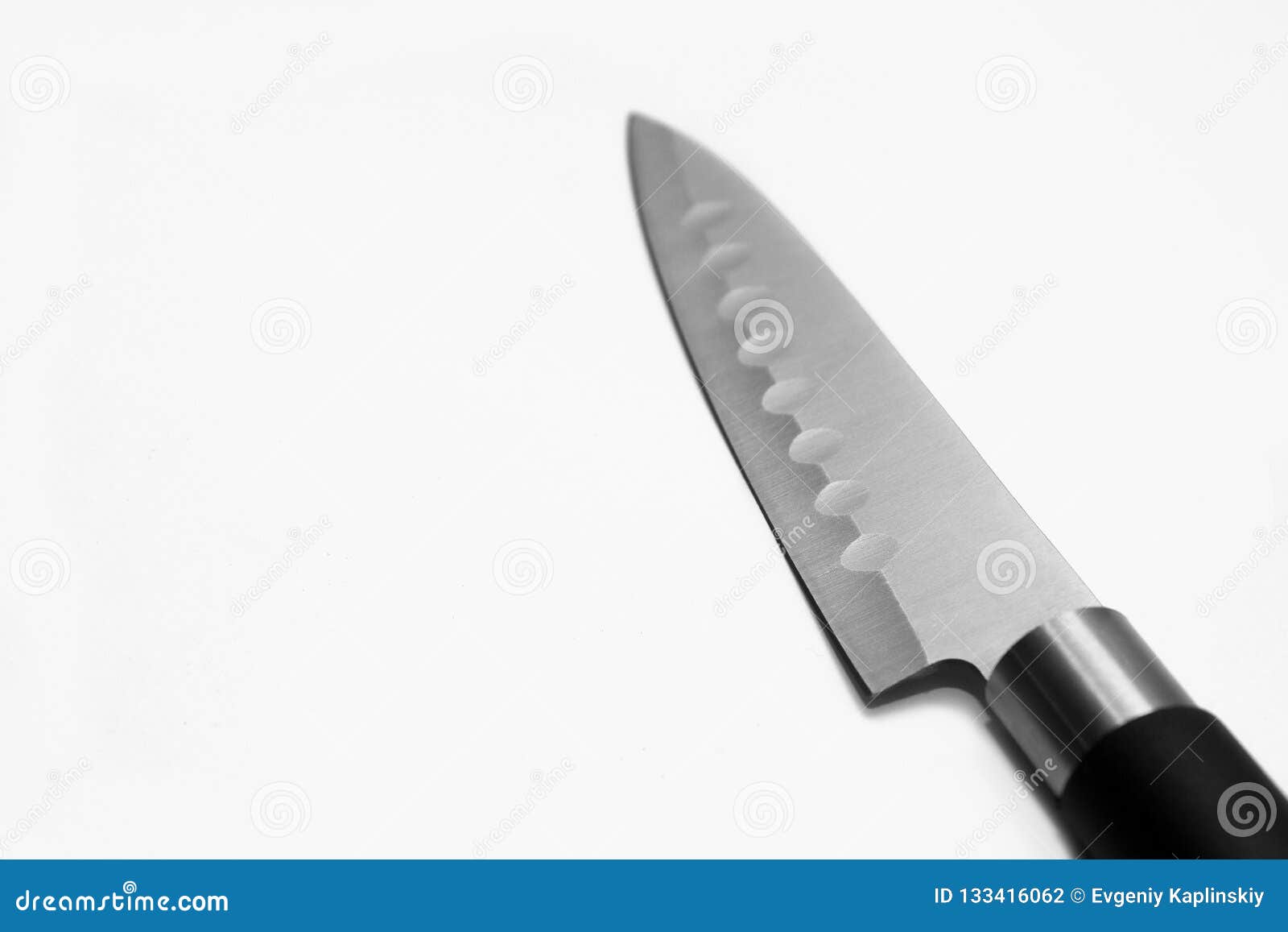Kitchen Steel Sharp Knife with a Black Handle on a Gray Background ...