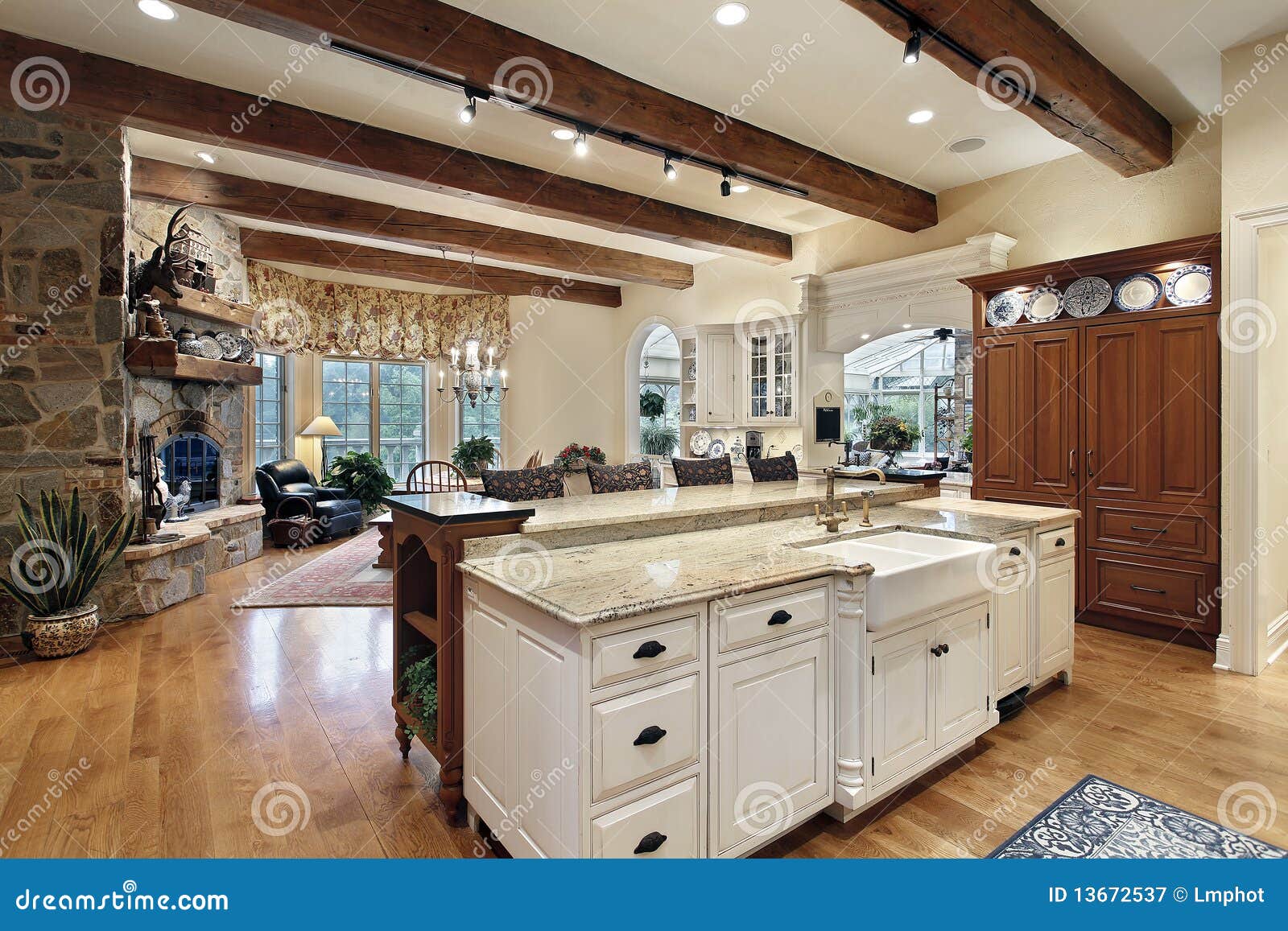 Kitchen with Stone Fireplace Stock Image - Image of furnishings, chair ...