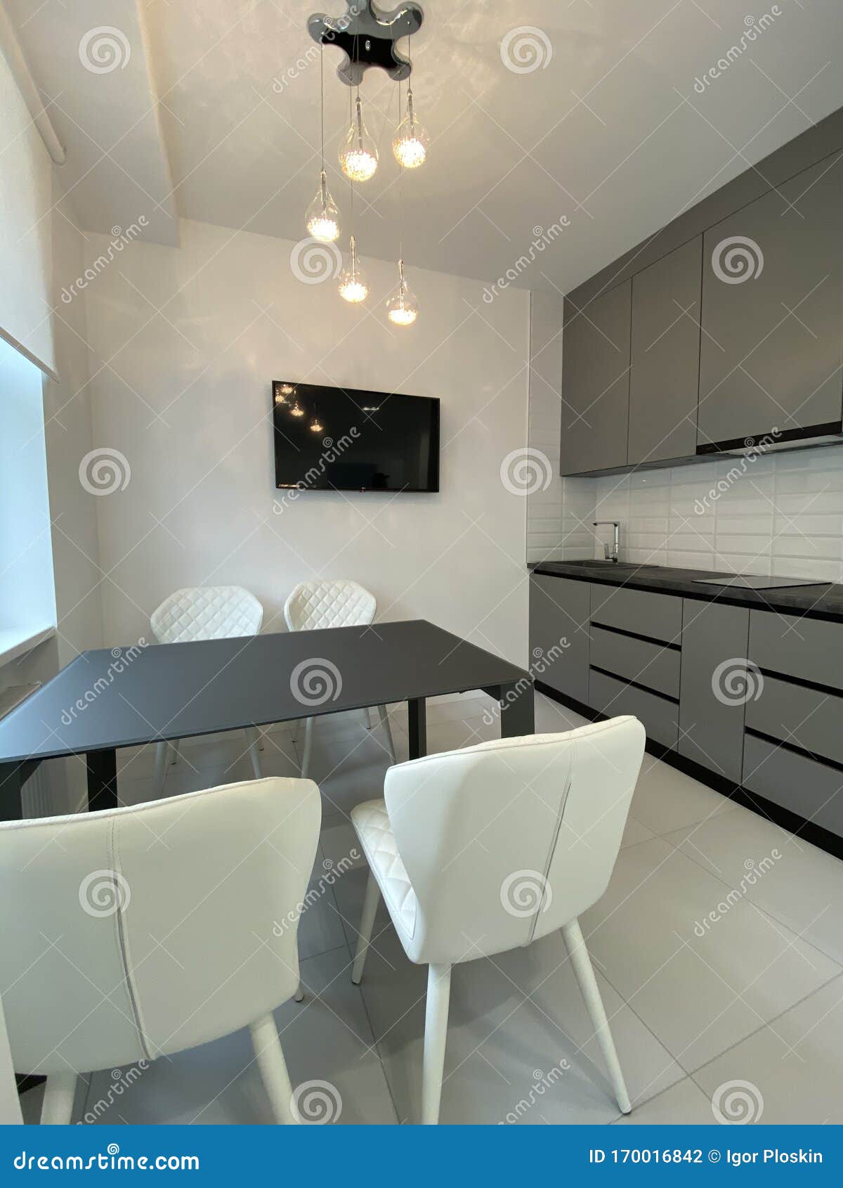 Kitchen Studio in White Style with a TV Stock Photo - Image of couch ...