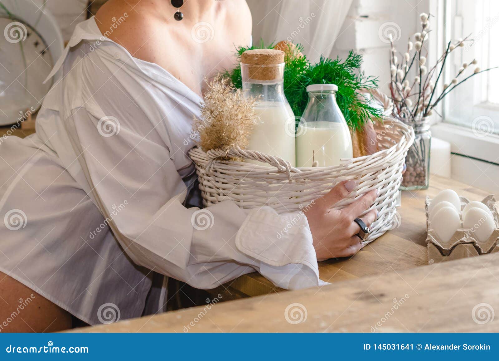 Kitchen Table with Bottled Milk and Herbs Stock Image - Image of ...