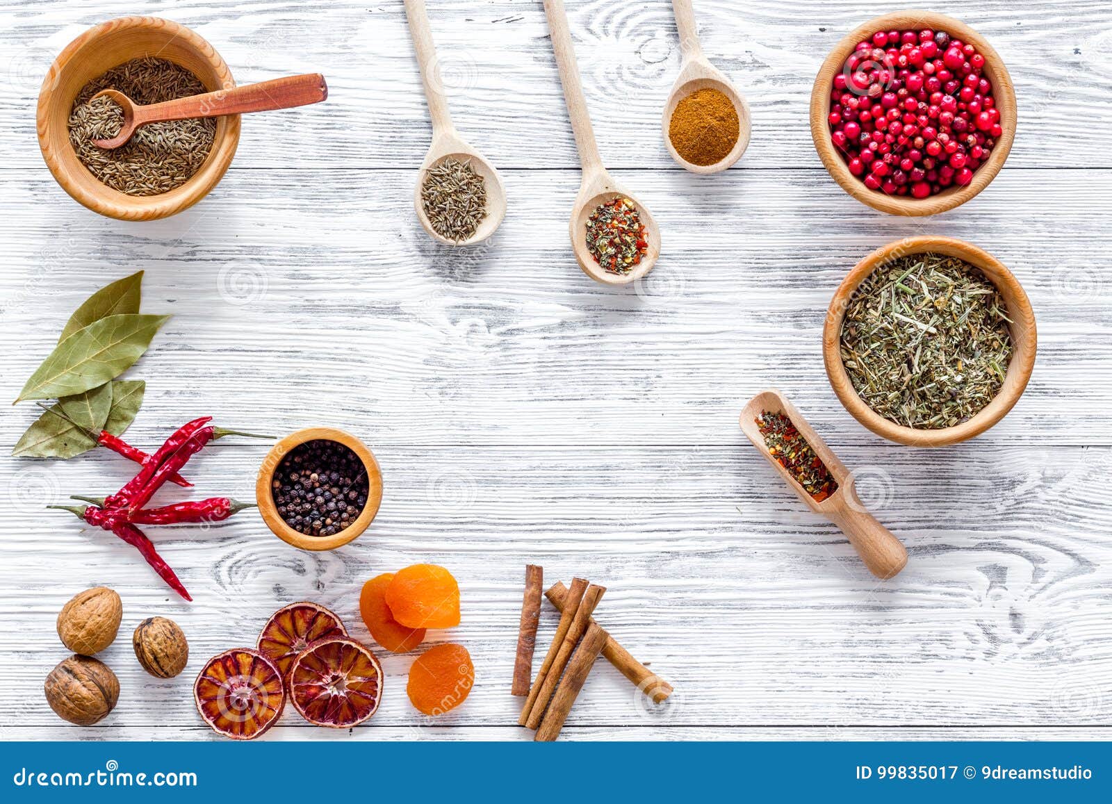 Kitchen Table with Spices and Dry Herbs on Light Wooden Kitchen ...