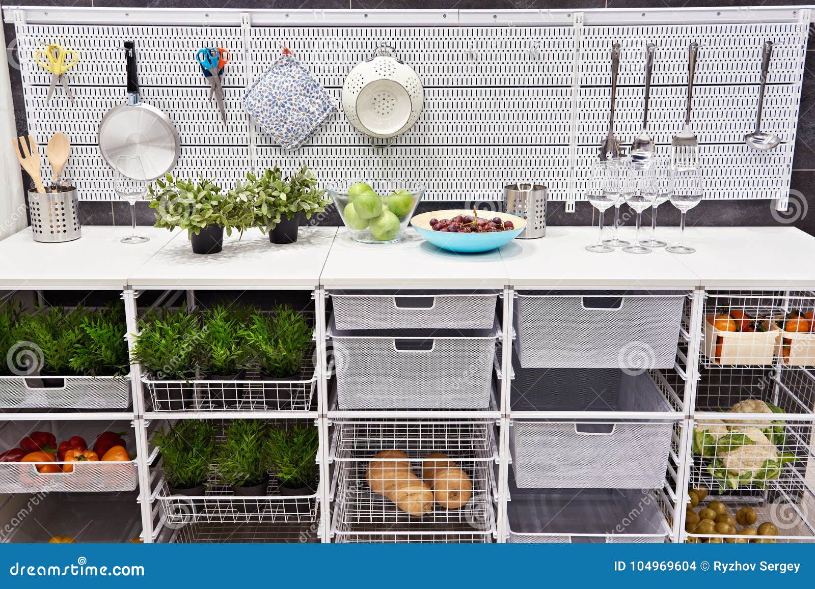 Kitchen Table with Utensils and Storage Boxes for Vegetables Stock ...