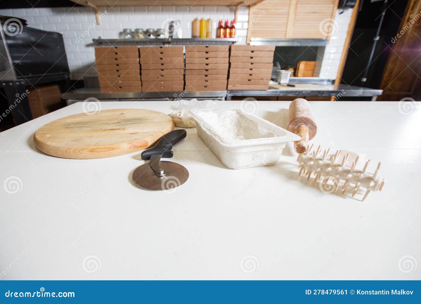 A Kitchen Tool for Making Dough. Dough for Pizza, the Chef Rolls Out ...