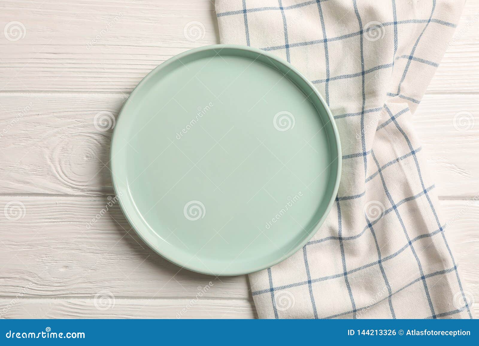 Kitchen Towel with Plate on Wooden Background Stock Photo - Image of ...