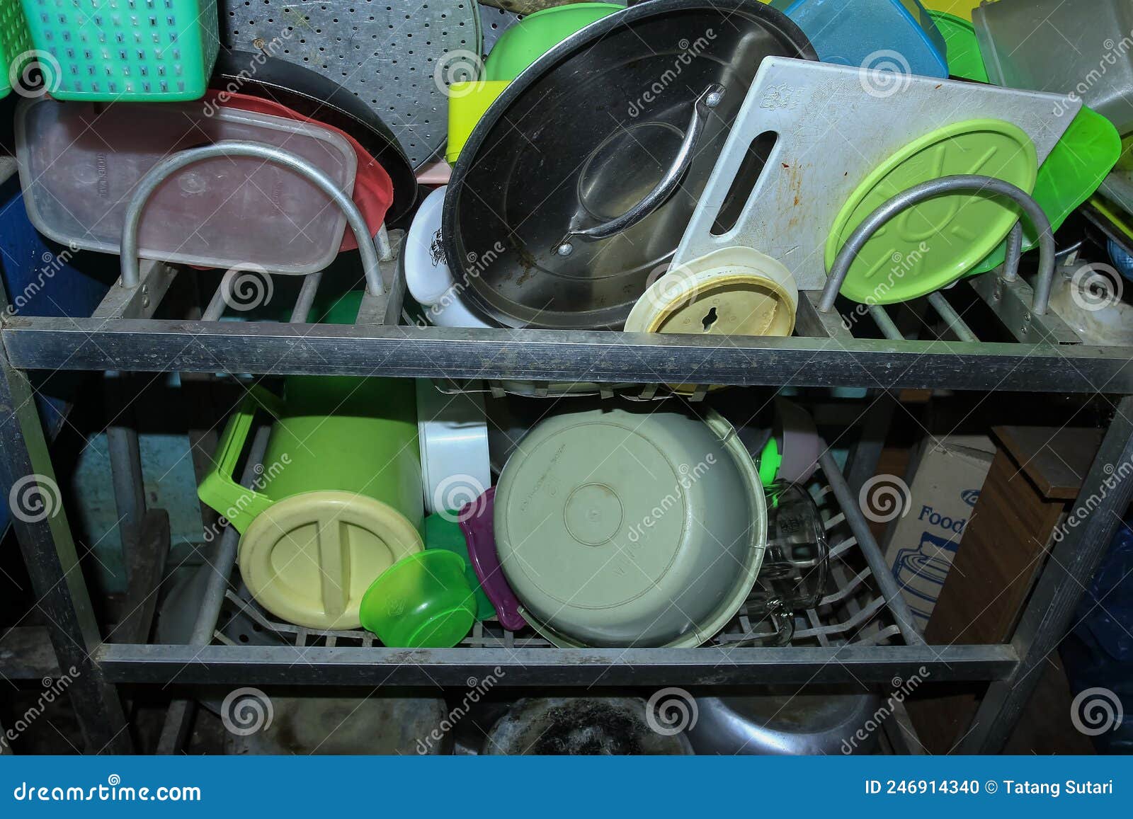 Kitchen Utensils in the Form of Plates on the Shelf Stock Photo - Image ...