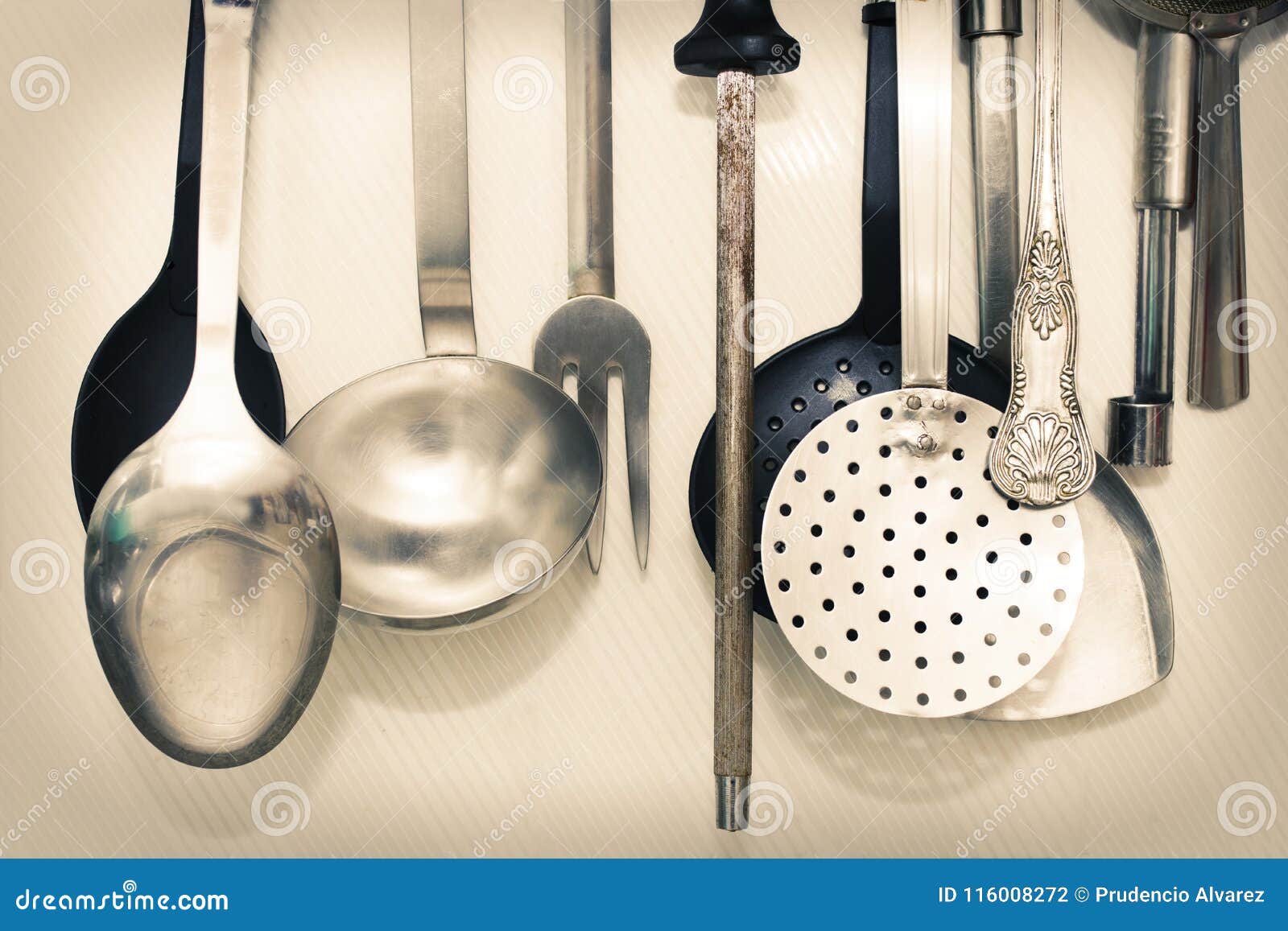 Kitchen utensils hung stock photo. Image of iron, hung - 116008272