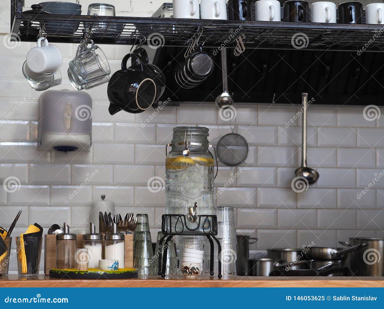 Kitchen Utensils on the Wall in the Kitchen. Stock Image - Image of ...