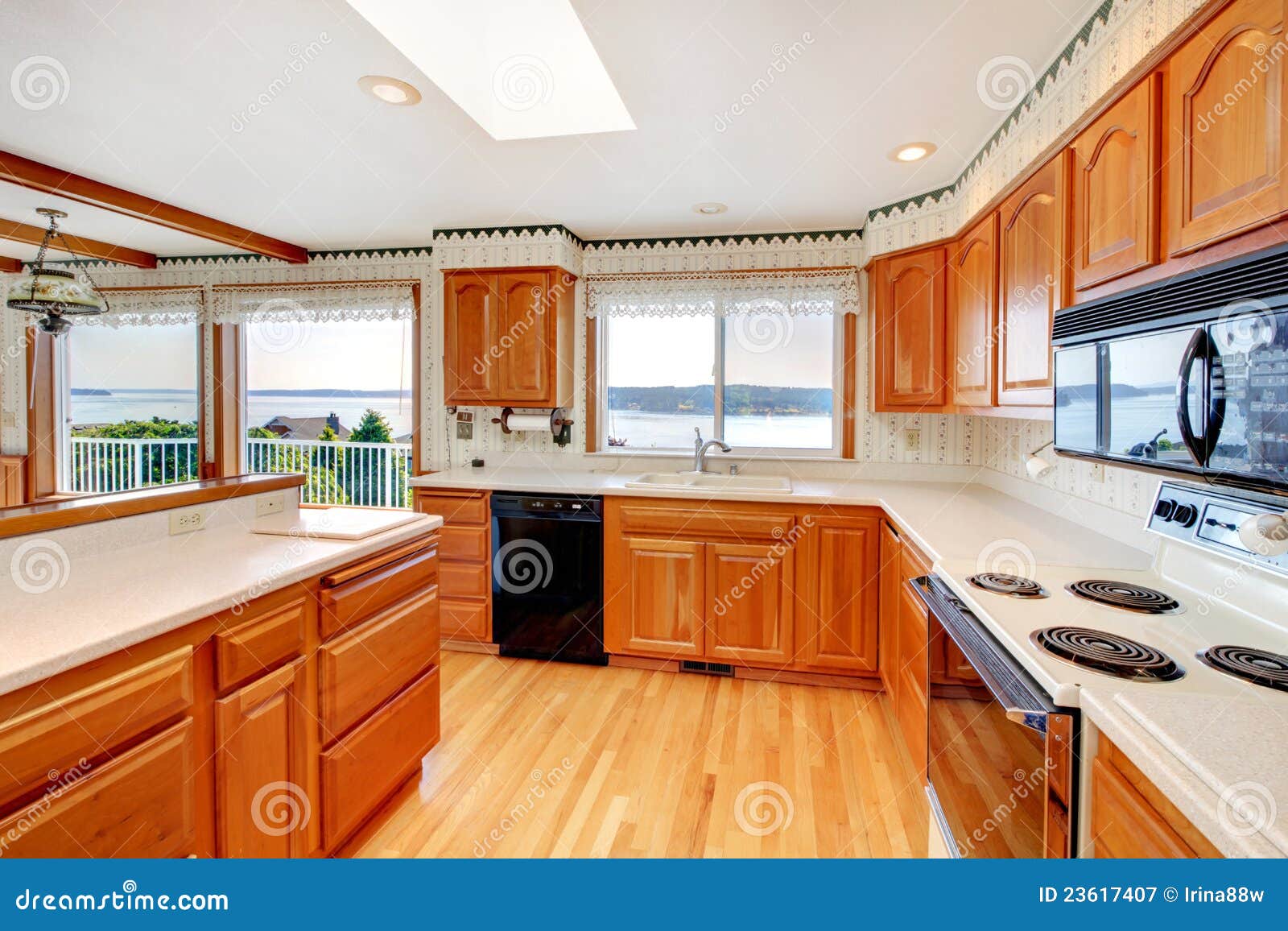 Kitchen with Water View and White Countertop. Stock Image - Image of ...