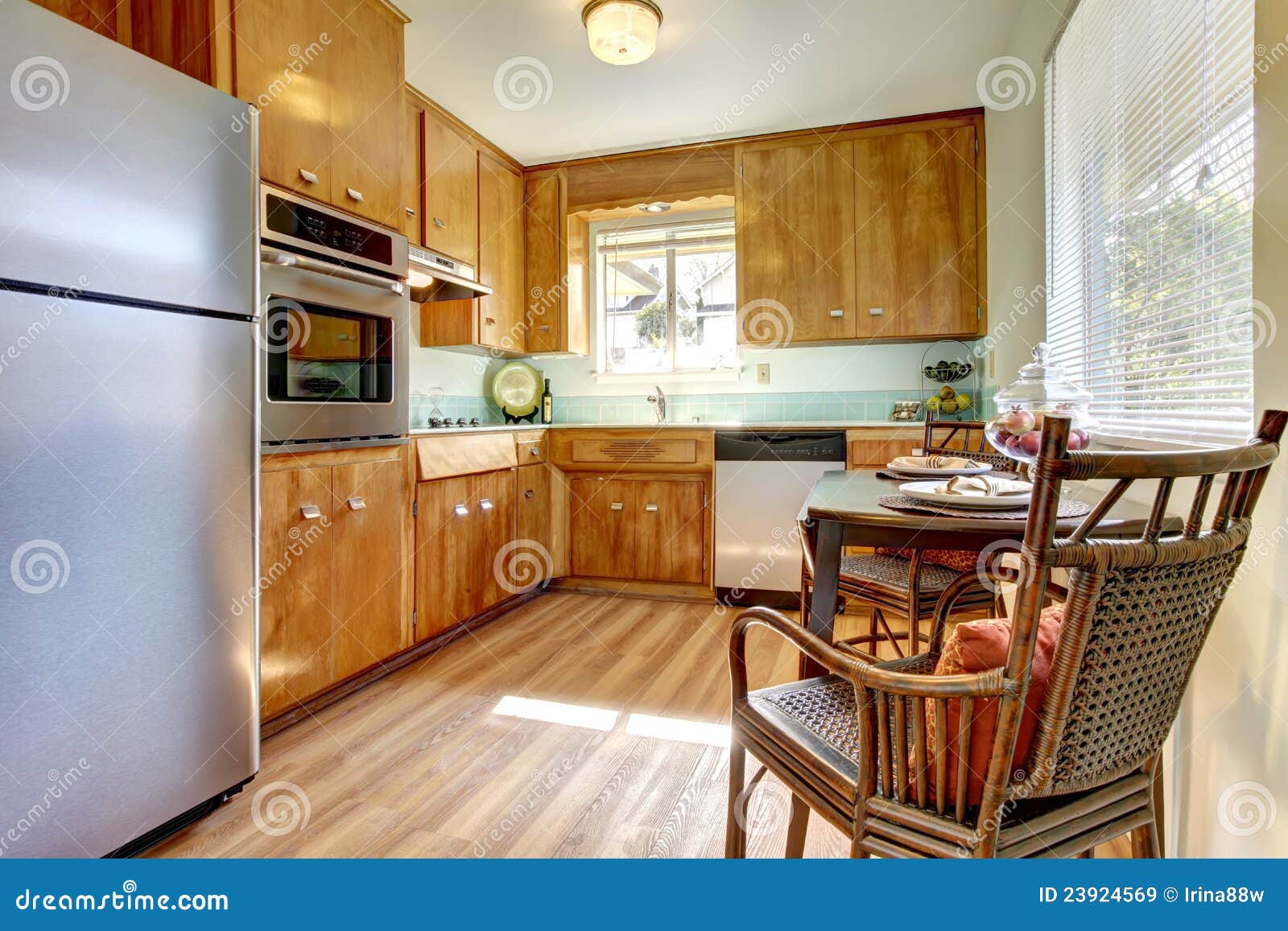 Kitchen with Wood Cabinets and Chair. Stock Image - Image of modern ...