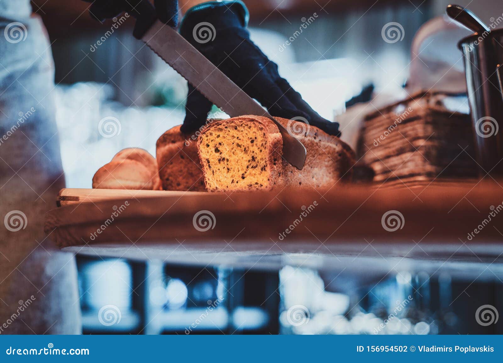 Kitchen Worker is Slicing Bread for Lunch Stock Photo - Image of ...