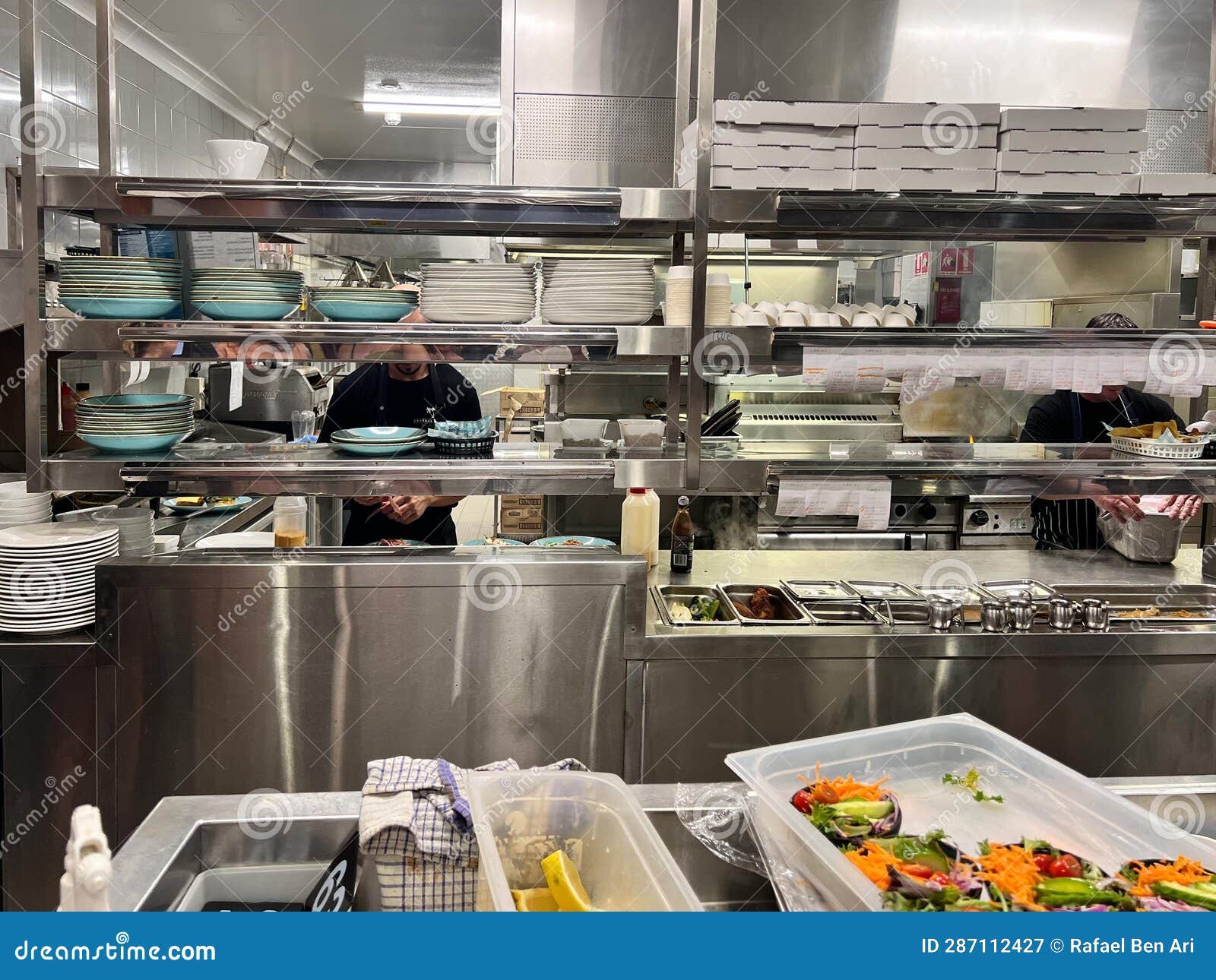 Kitchen Workers Working in Commercial Kitchen Editorial Photography ...