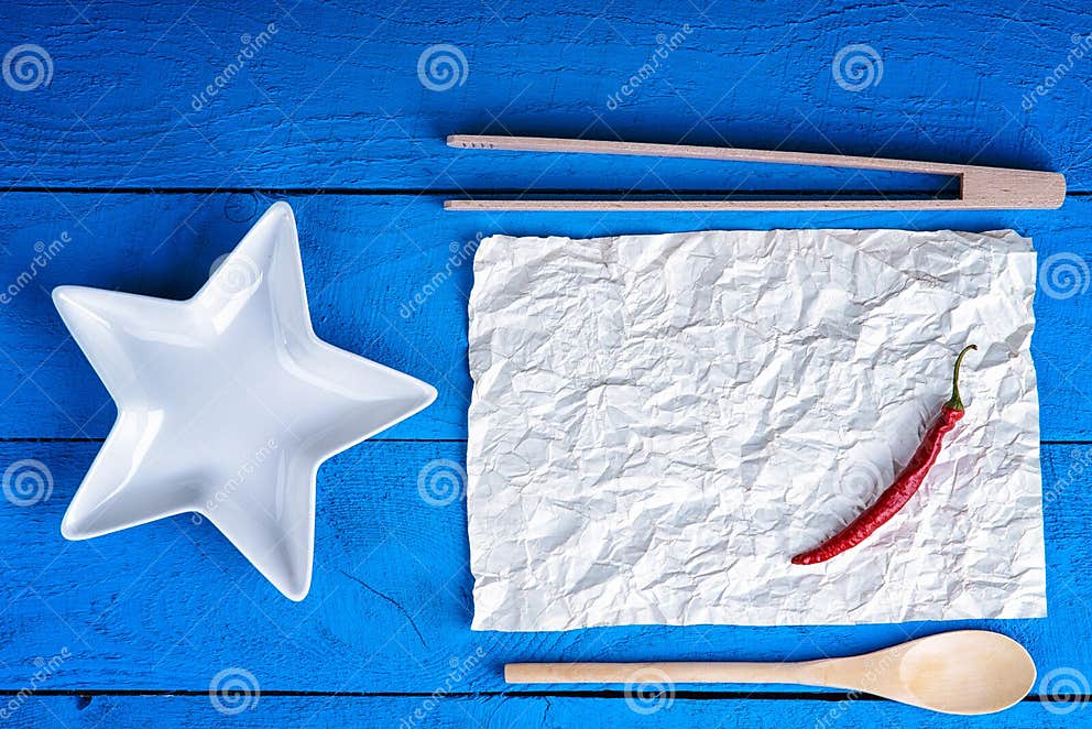 Kitchenware and Red Chili Pepper on a Sheet of Paper Stock Image ...