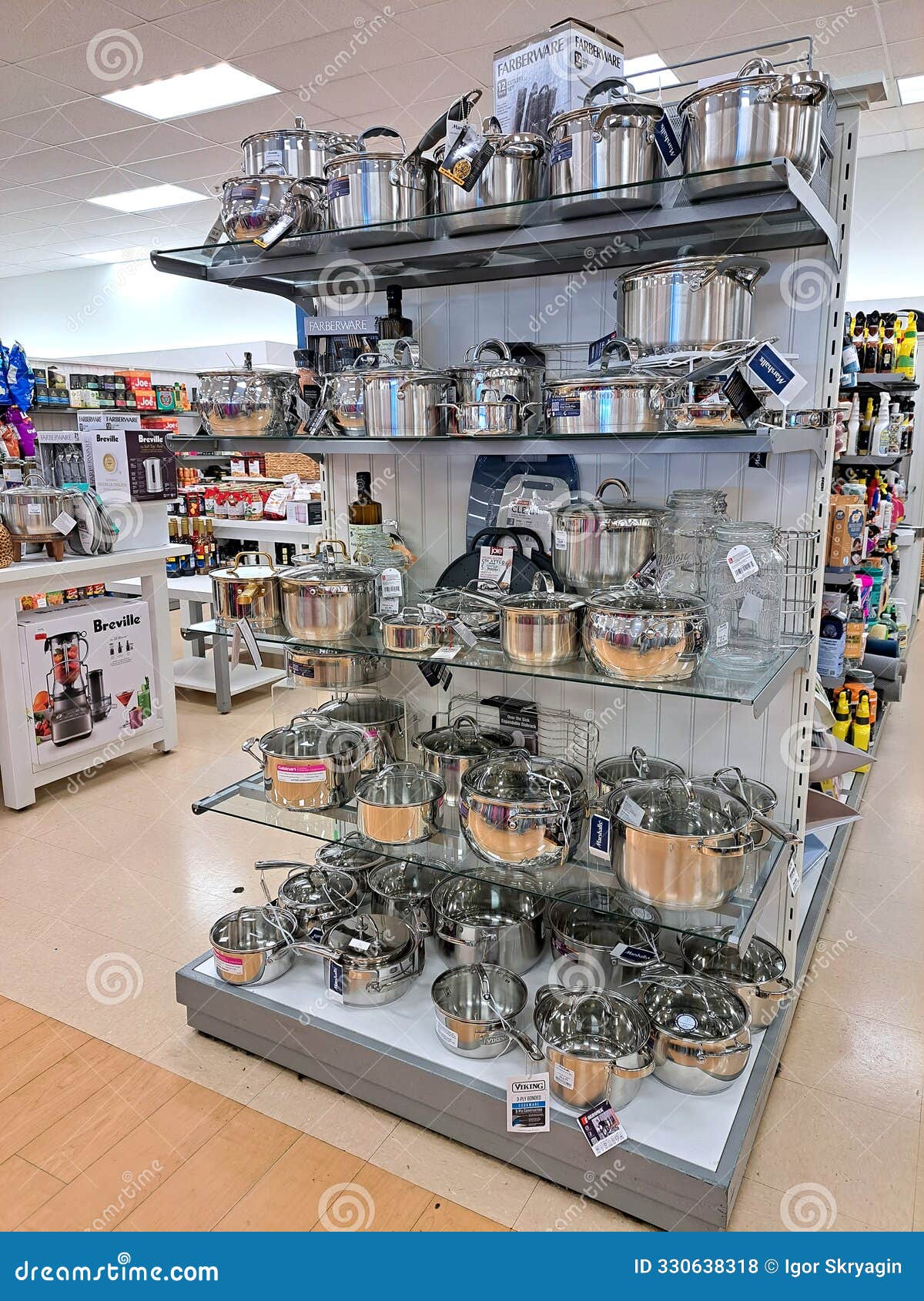 The Kitchenware Section of a Large Store. a Counter with Steel Pots ...