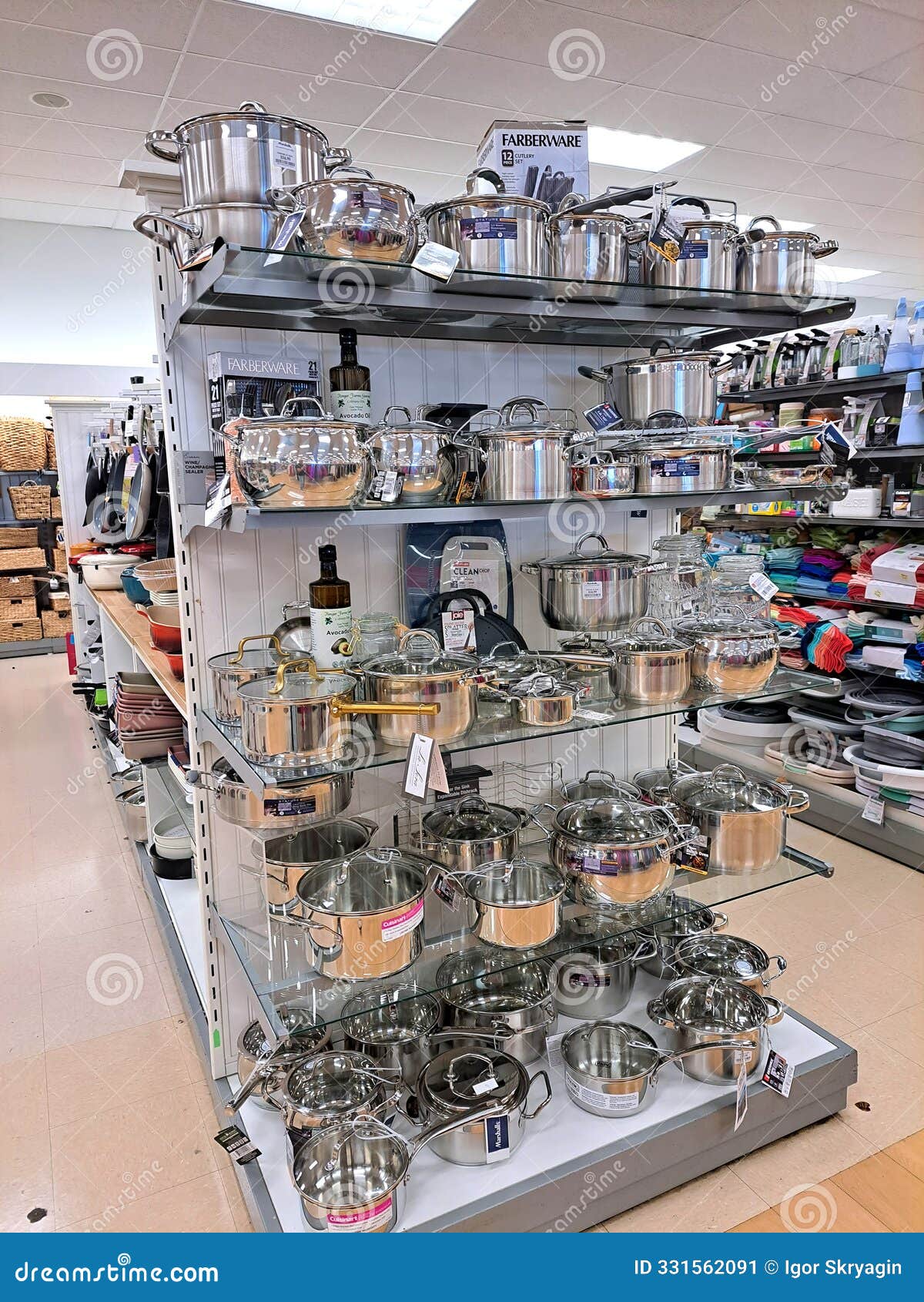 The Kitchenware Section of a Large Store. a Counter with Steel Pots ...
