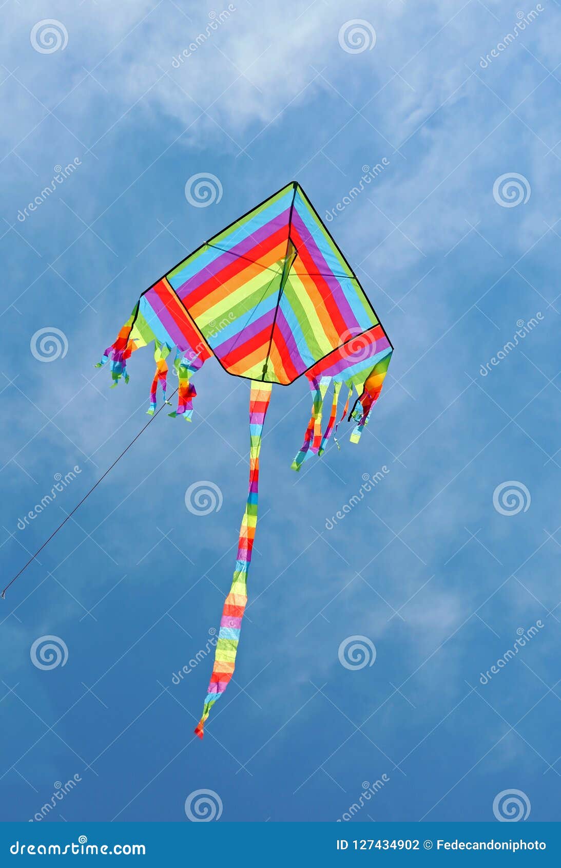 Kite with the Colors of the Rainbow Flies in the Sky Stock Photo ...
