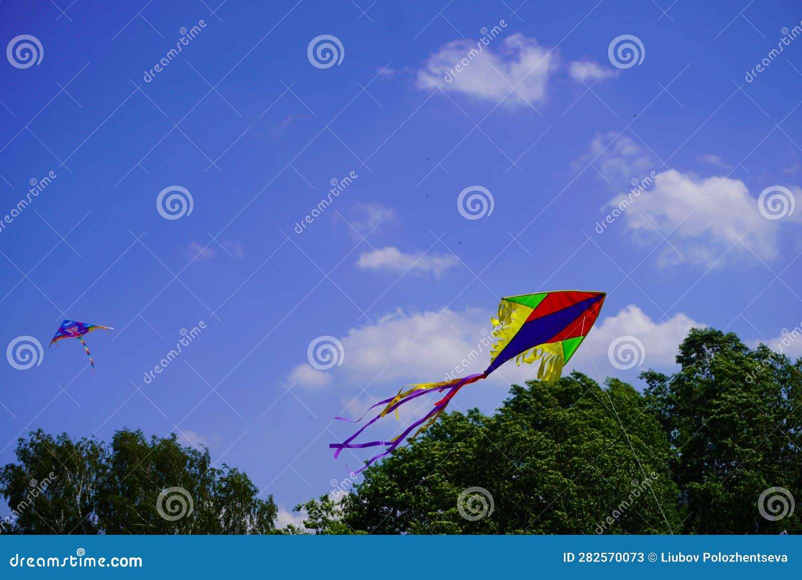A Kite Flies in the Blue Sky Stock Image - Image of outdoors, childhood ...
