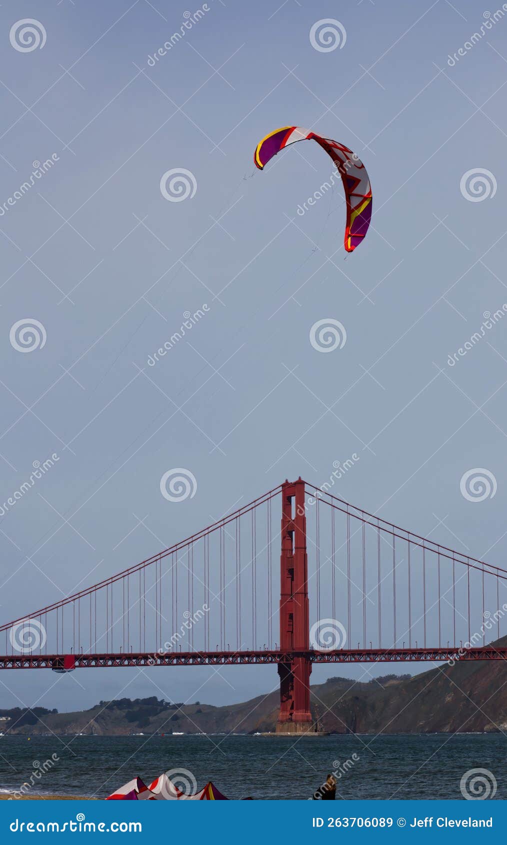 Kite Flying in Blue Sky with Golden Gate Bridge Background Stock Image ...