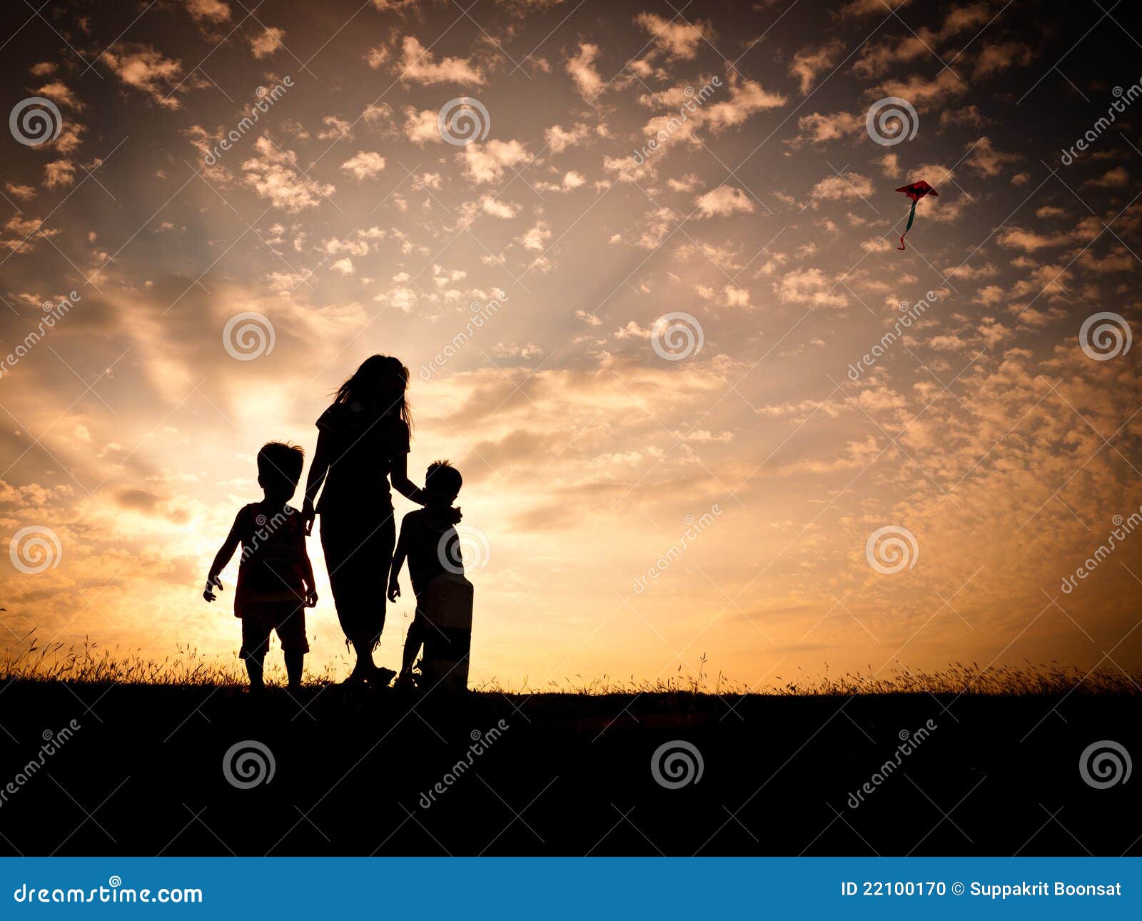 Kite flying at sunset stock photo. Image of playing, mother - 22100170