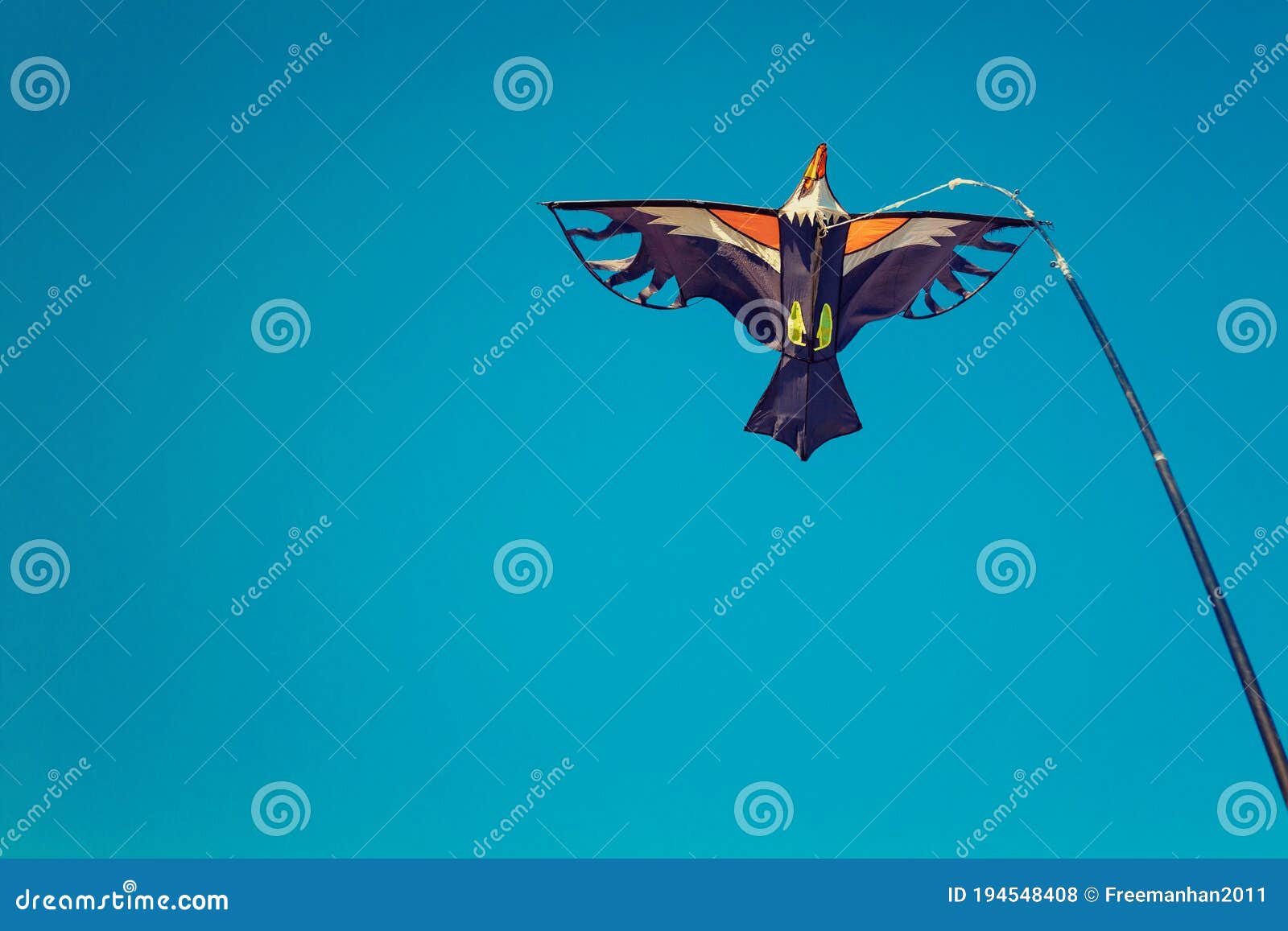 A Kite Soaring in the Blue Sky. Copy Space Stock Photo - Image of ...