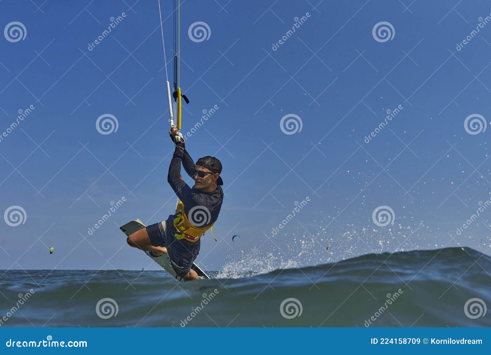 Kite Surfer Riding a Kiteboard Stock Image - Image of jump, adrenaline ...