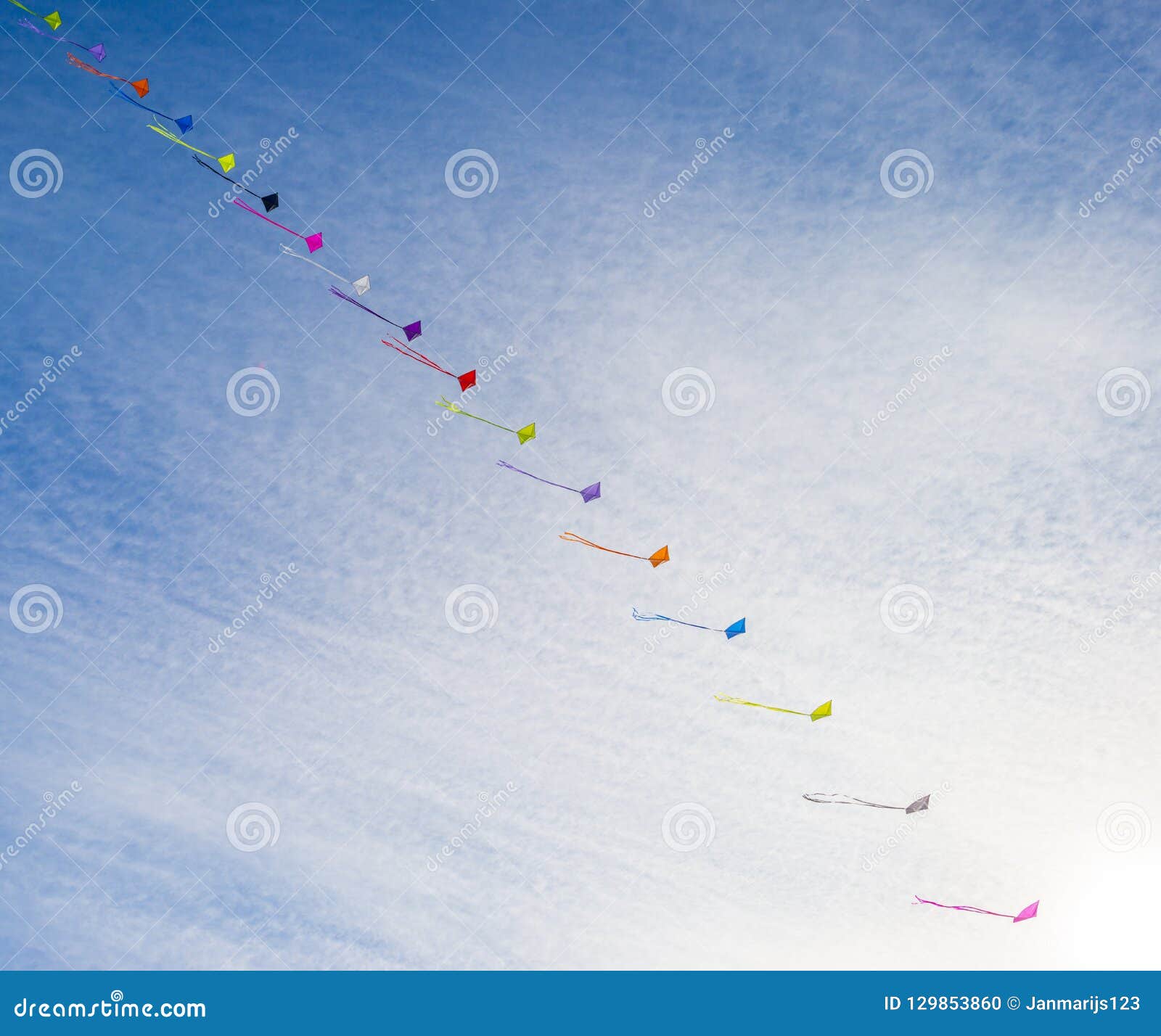 Kites Flying in the Wind in a Blue Sky in Sunlight at Fall Stock Photo ...