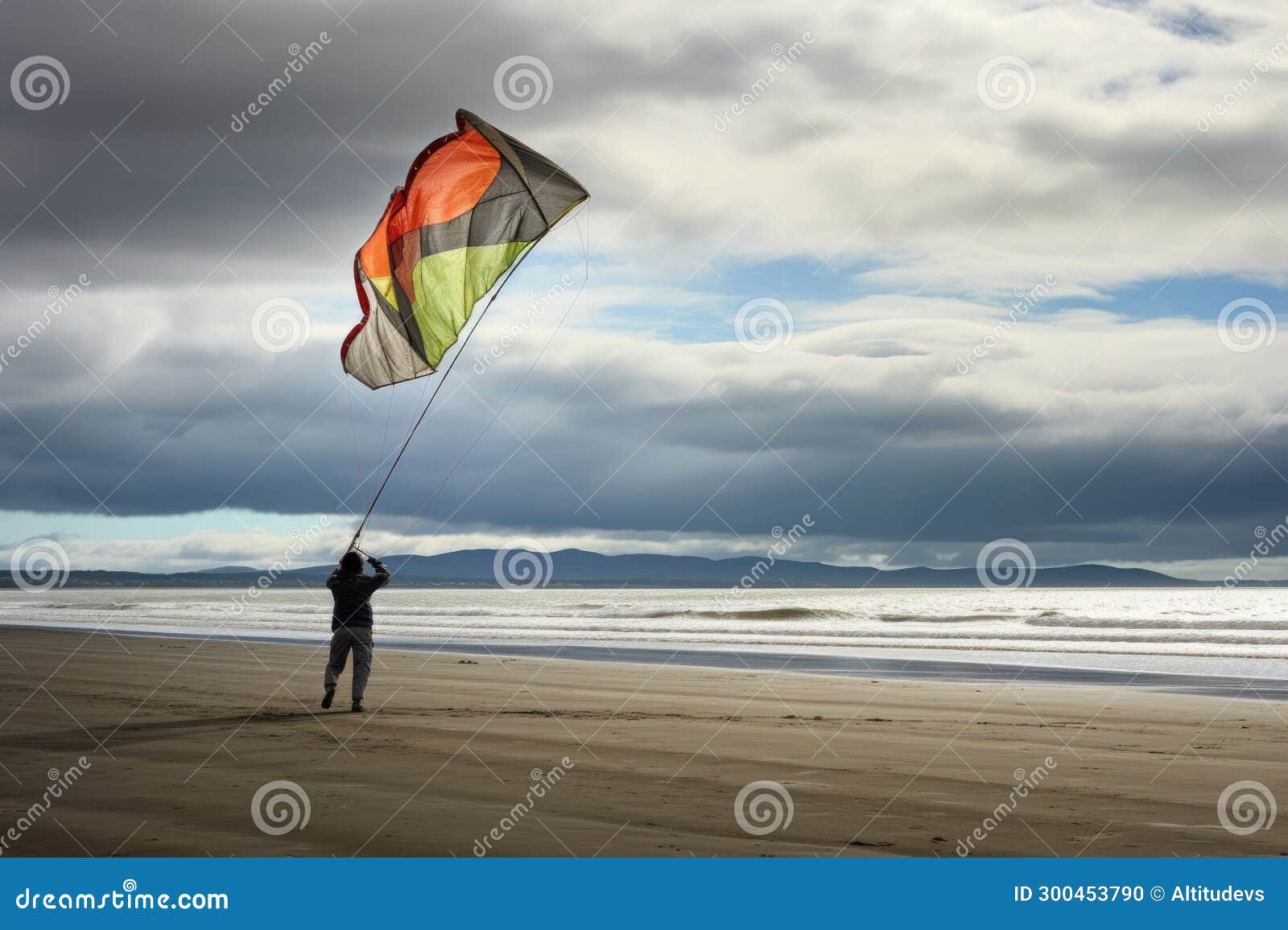 Kitesurfer Launching Their Kite on a Windy Beach Stock Photo - Image of ...