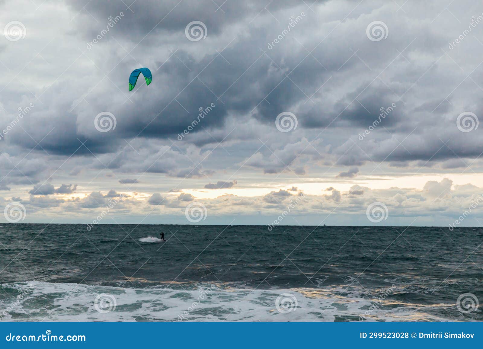 Kitesurfing Athlete Riding Waves in a Storm Stock Photo - Image of ...