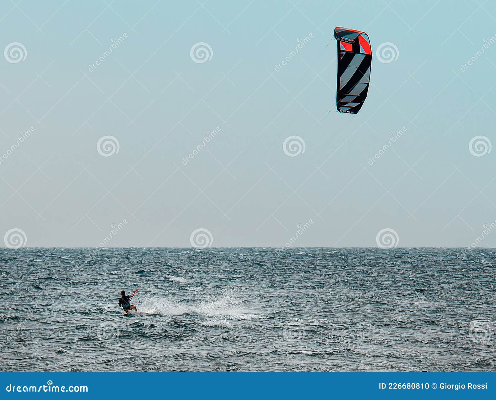 Kitesurfing during a Windy Day with a Very Rough Sea Editorial Image ...