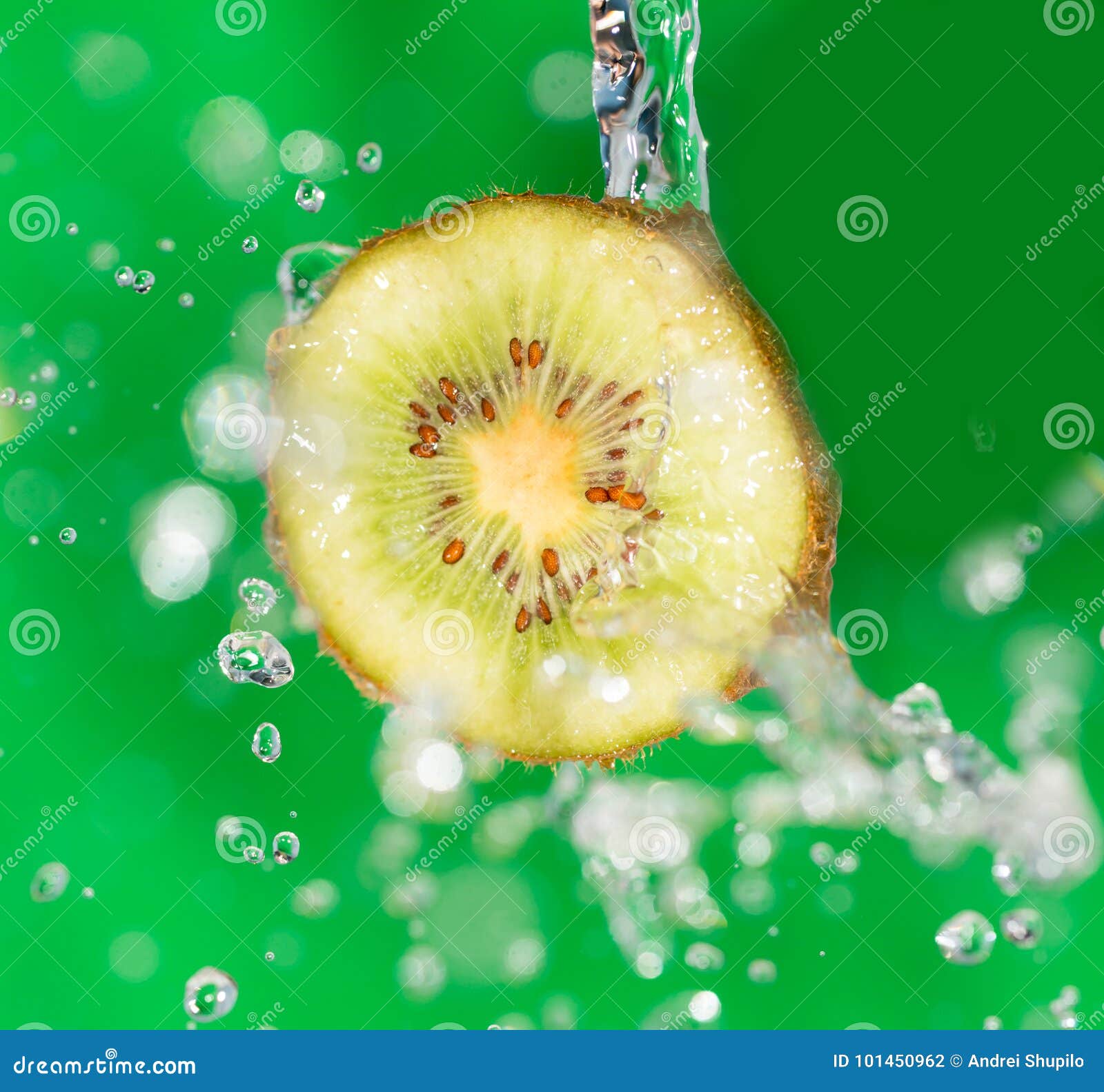 Kiwi in Water on a Green Background Stock Photo - Image of food, nature ...