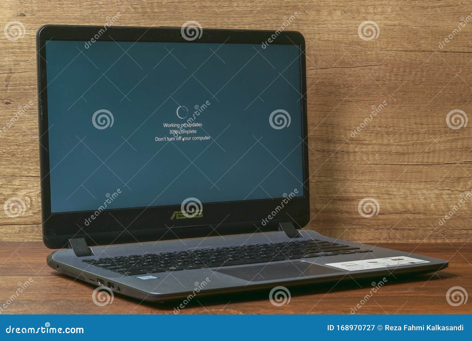 The Laptop with Windows Update on Screen. Its Offers Increased Security ...
