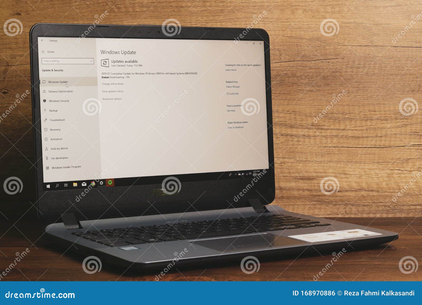 The Laptop with Windows Update on Screen. Its Offers Increased Security ...