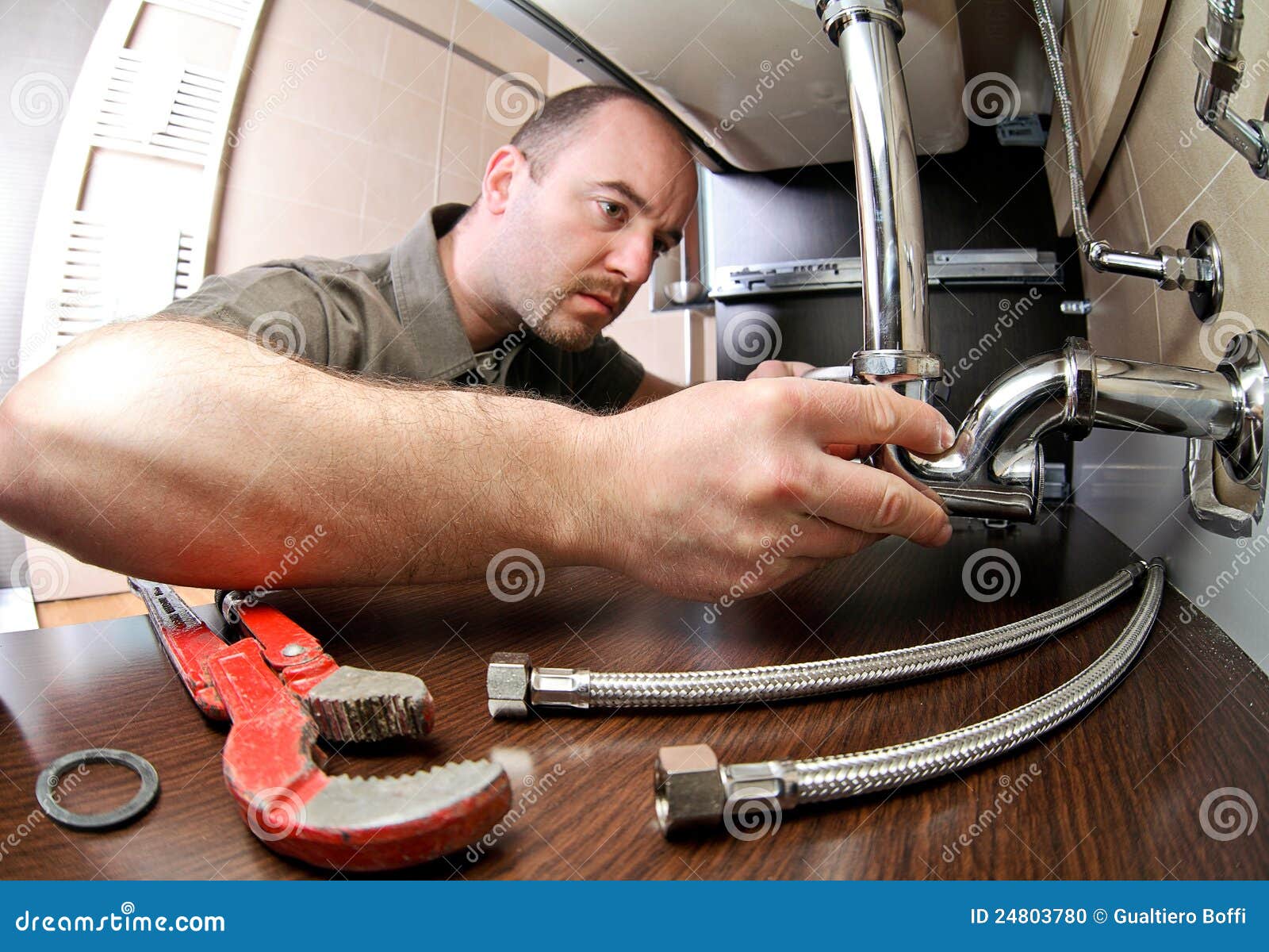 Klempner ta-Arbeit stockfoto. Bild von freundlich, beruf - 24803780