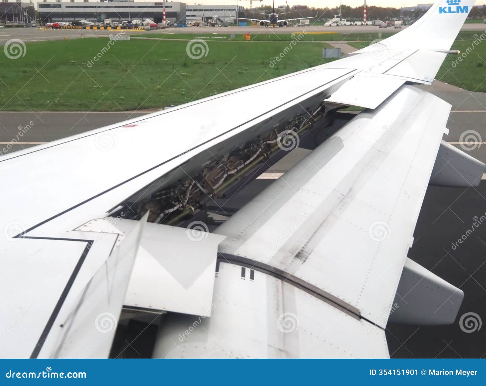 KLM Airplane Wind By Embraer With Landing Flaps Editorial Photo | CartoonDealer.com #354151985