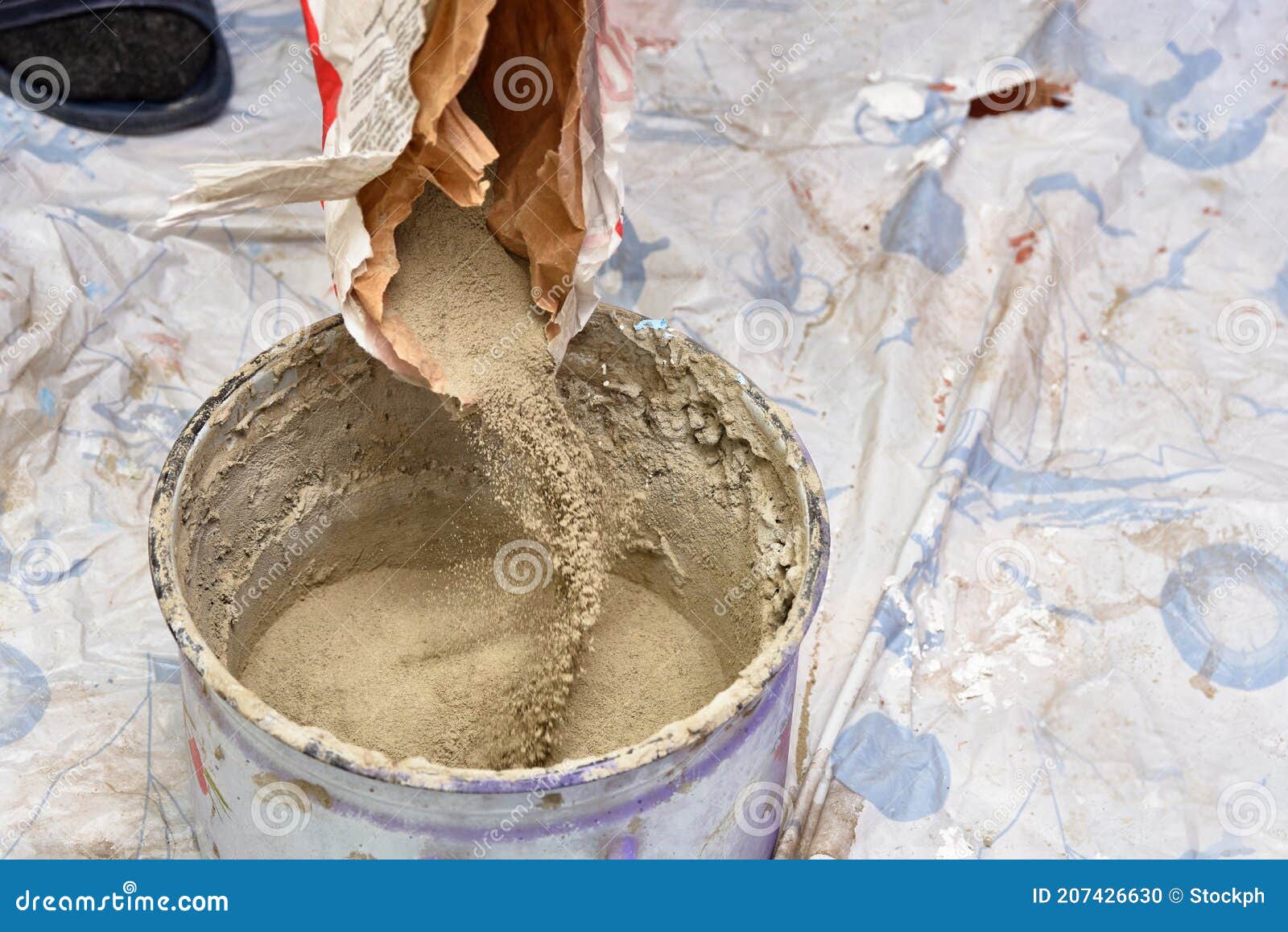 Kneading Cement Mortar in Container. Preparation for Repair Stock Photo ...