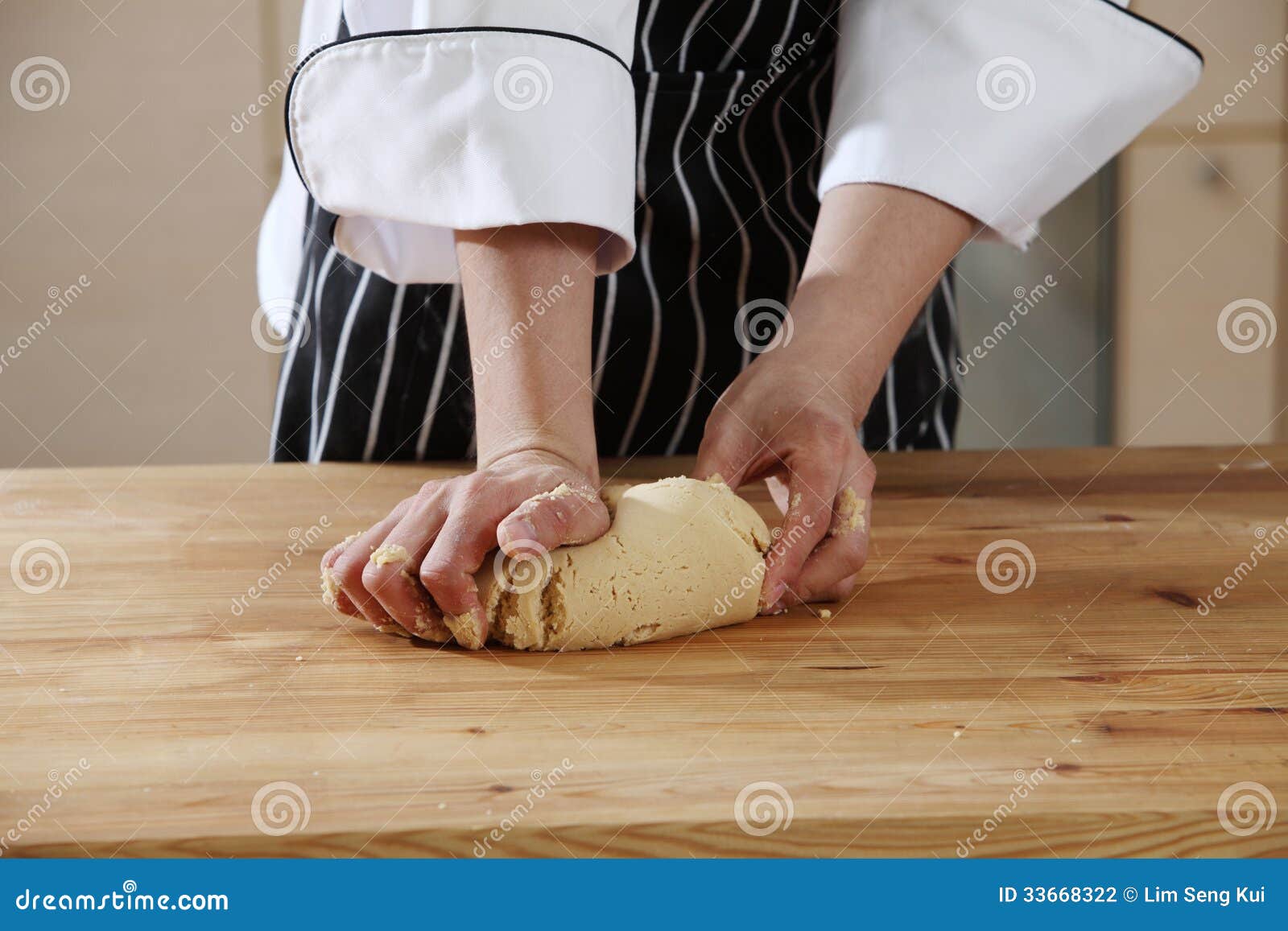 Kneading dough on table stock photo. Image of expert - 33668322