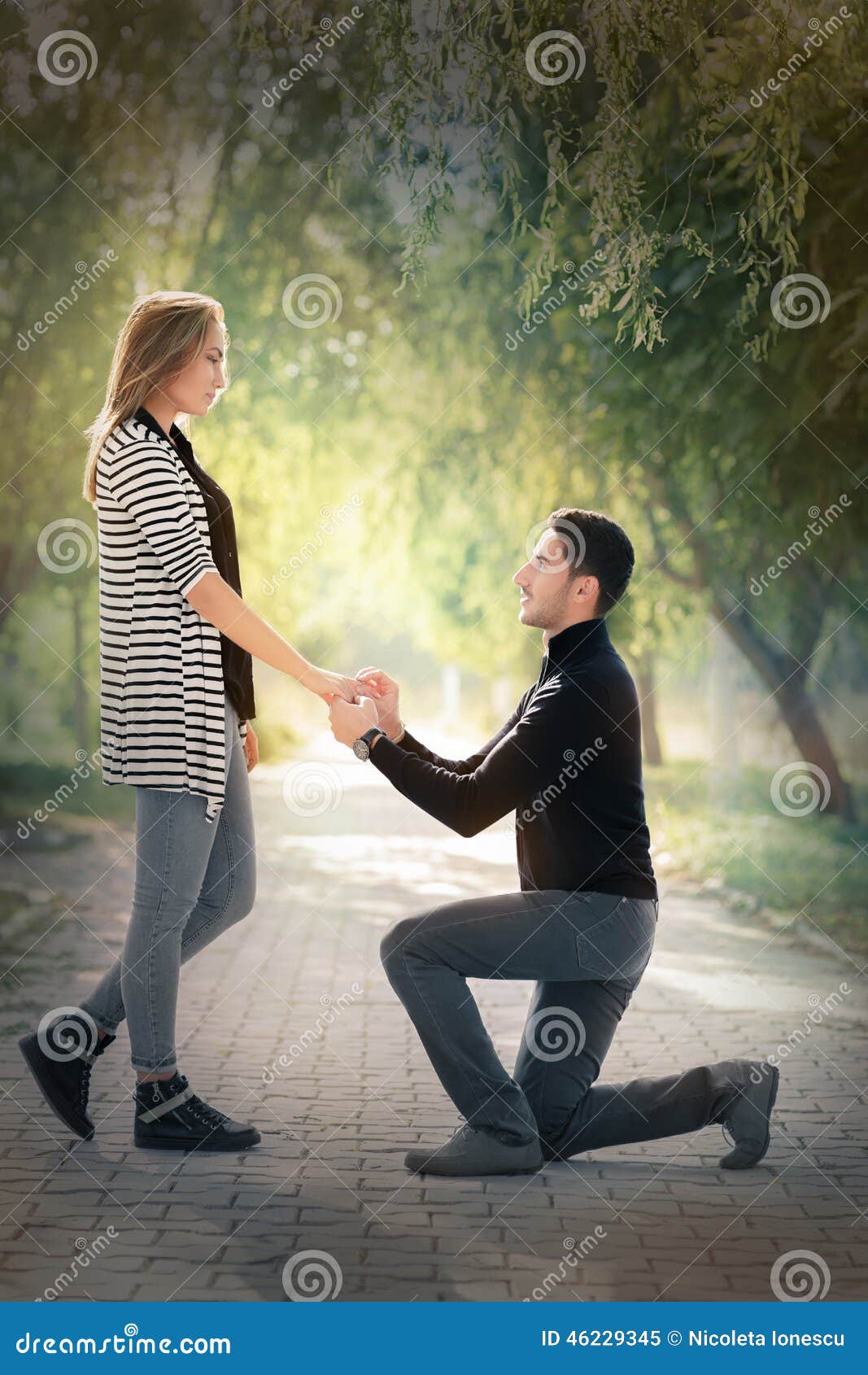 Kneeling Man Proposing With An Engagement Ring Stock Image Image Of