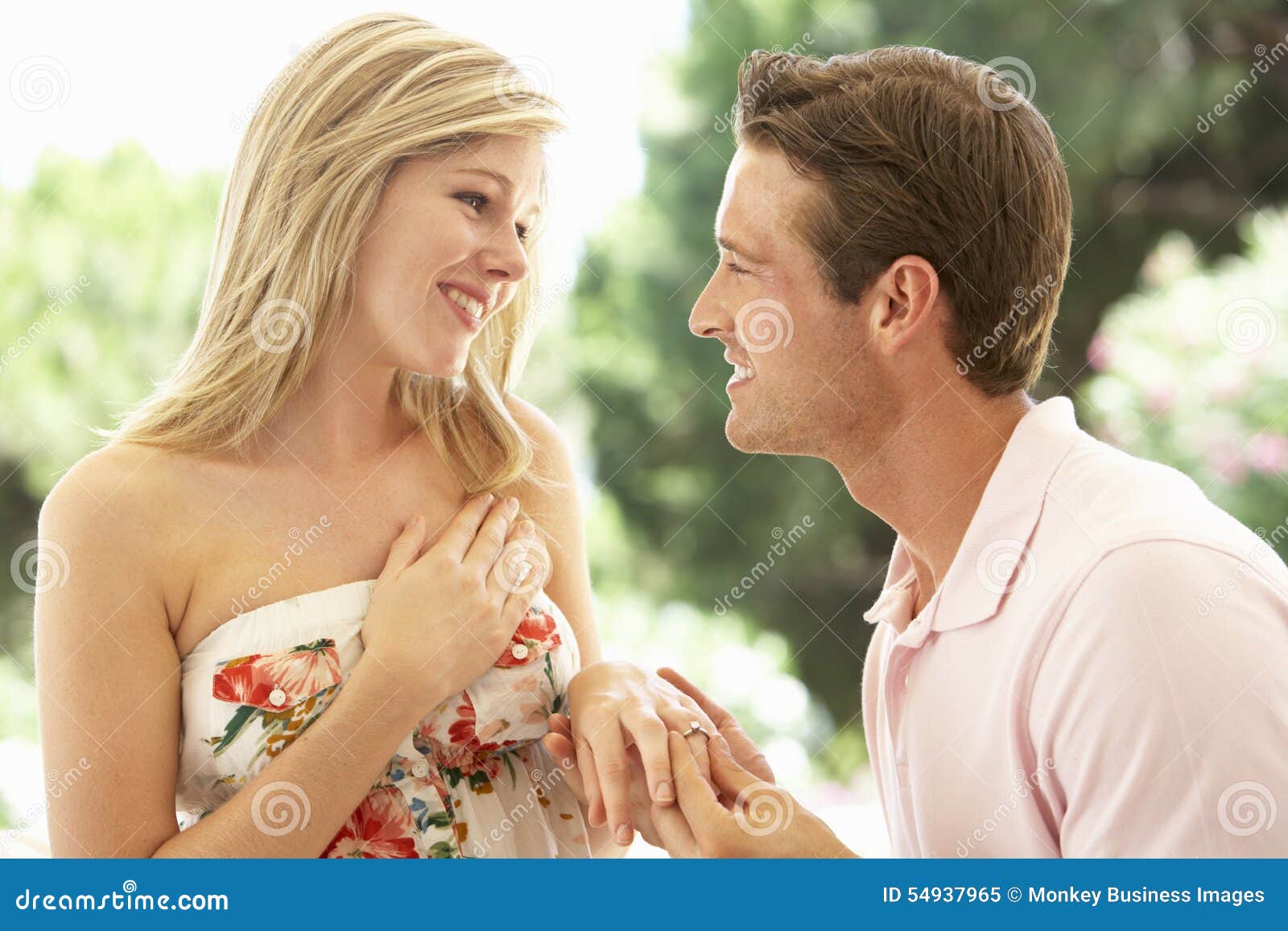 Kneeling Young Man Proposing To Woman Stock Image - Image of laughter ...
