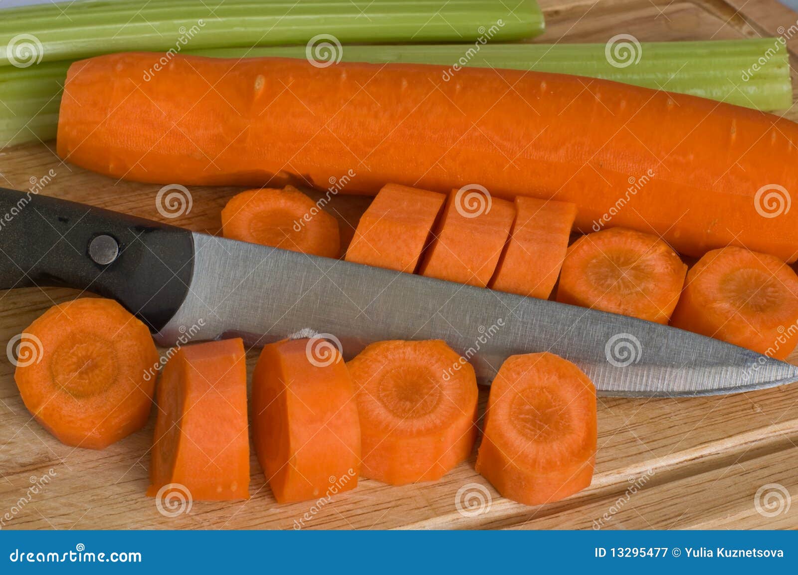 Knife cutting carrot stock image. Image of green, orange - 13295477
