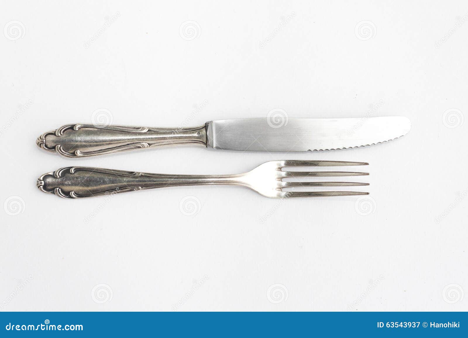 Knife, Fork, Fancy Silver Cutlery on White Stock Image - Image of ...