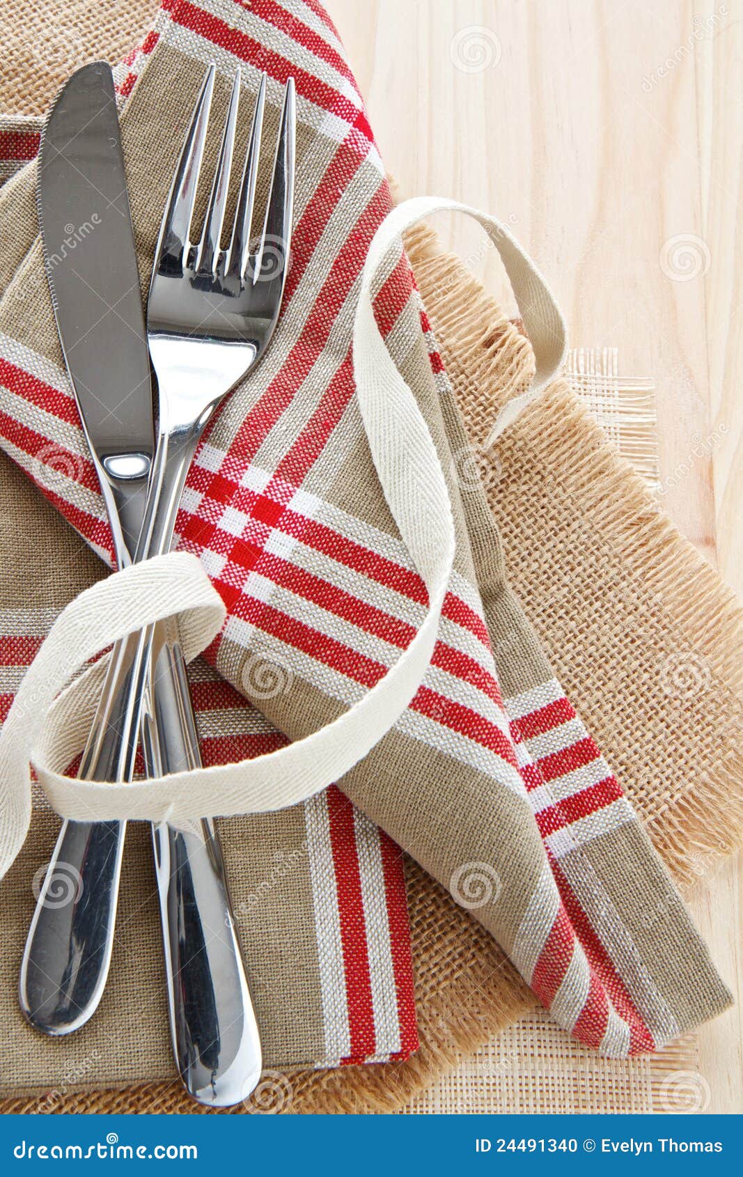 Knife and fork with napkin stock photo. Image of serviette - 24491340