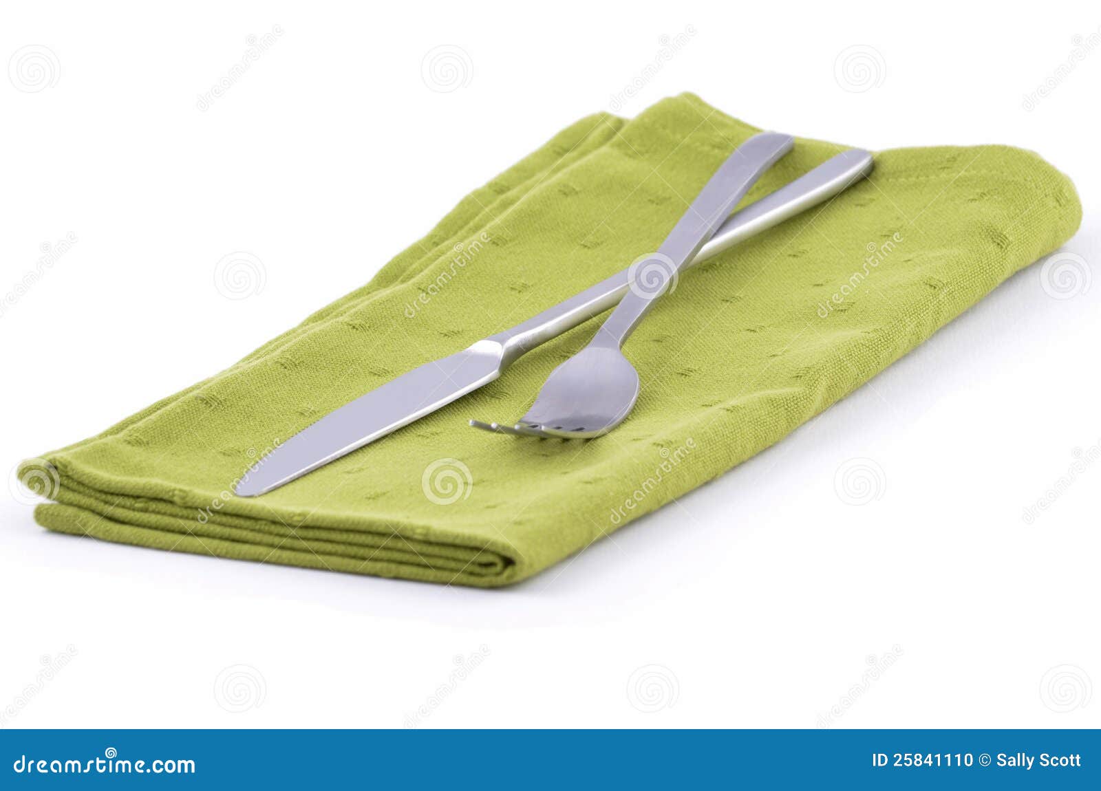 Knife and fork on napkin stock photo. Image of space - 25841110