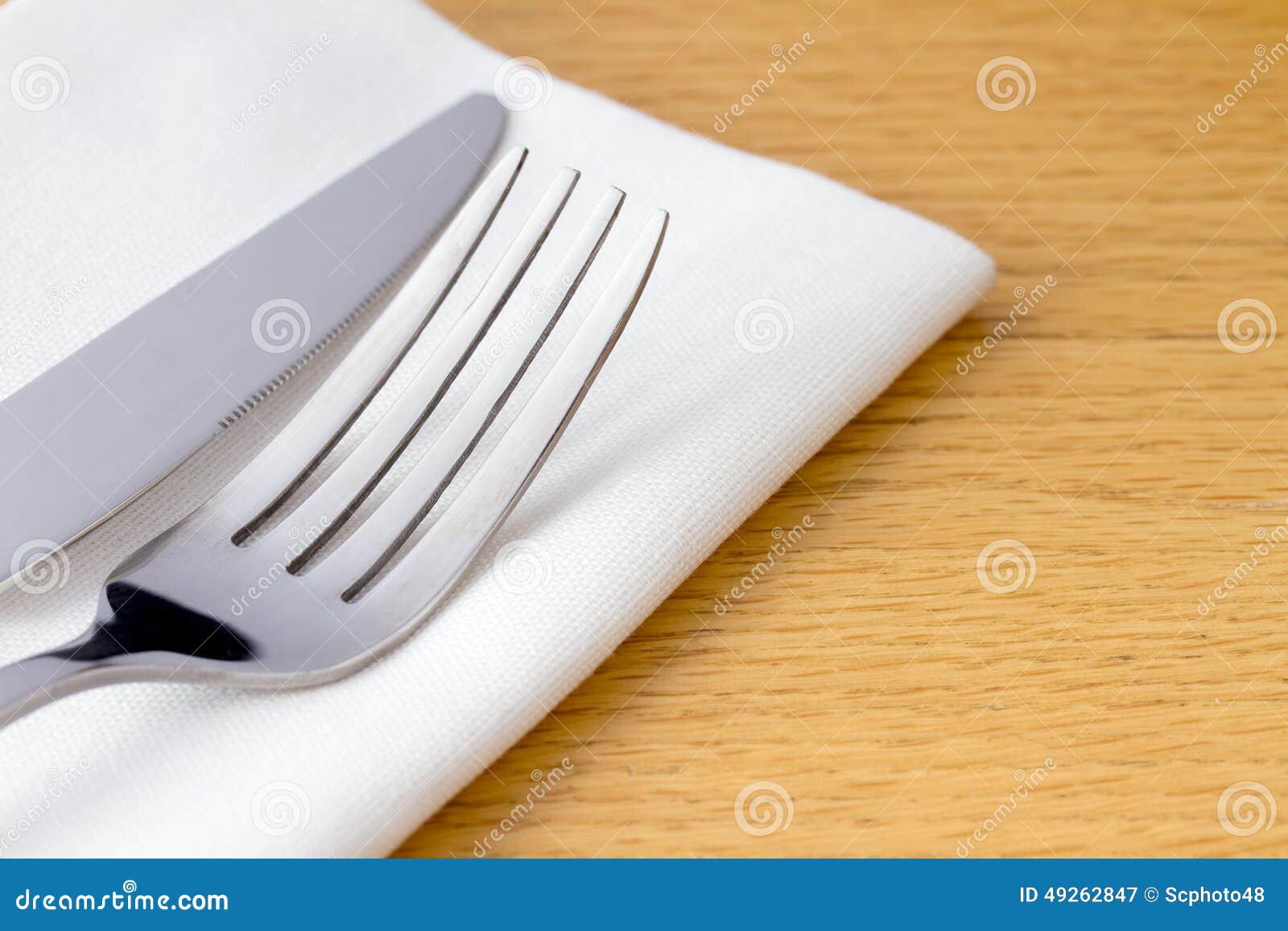 Knife and fork on a napkin stock image. Image of fork - 49262847