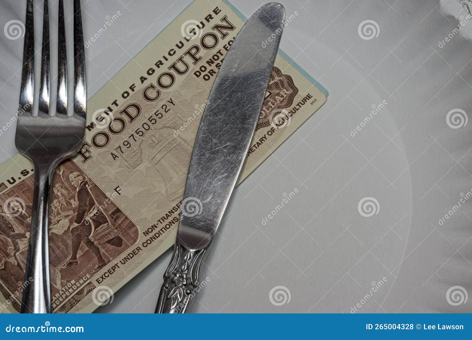 Knife and Fork on a Paper Food Stamp on a Paper Plate Stock Photo ...